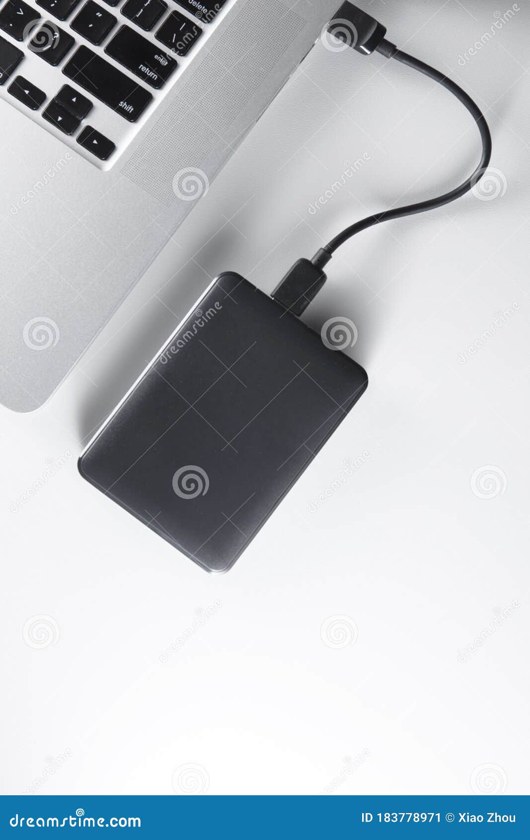 Hard drive and laptop stock image. Image of disk, cable - 183778971