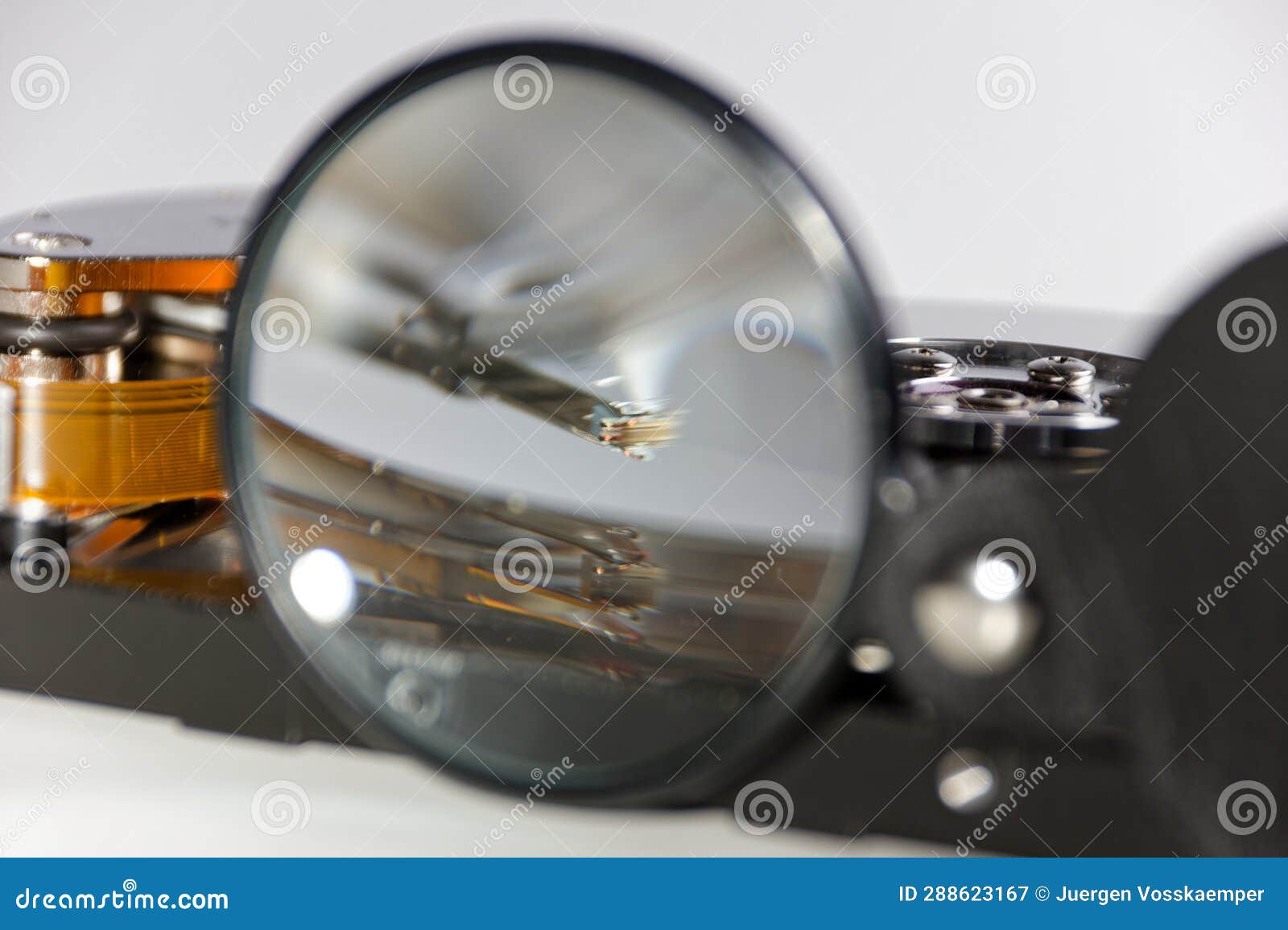 Hard Drive and Magnifying Glass, Representing the Process of Searching ...