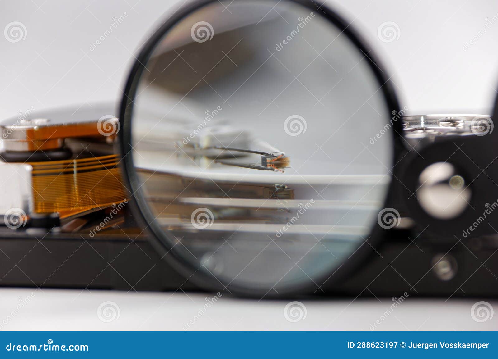 Hard Drive and Magnifying Glass, Representing the Process of Searching ...