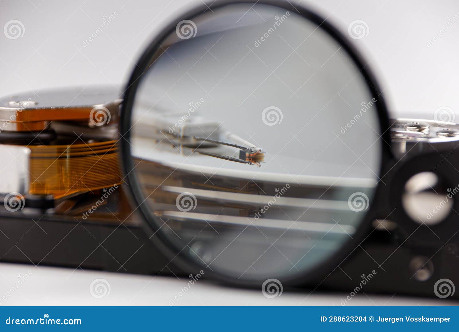 Hard Drive and Magnifying Glass, Representing the Process of Searching ...