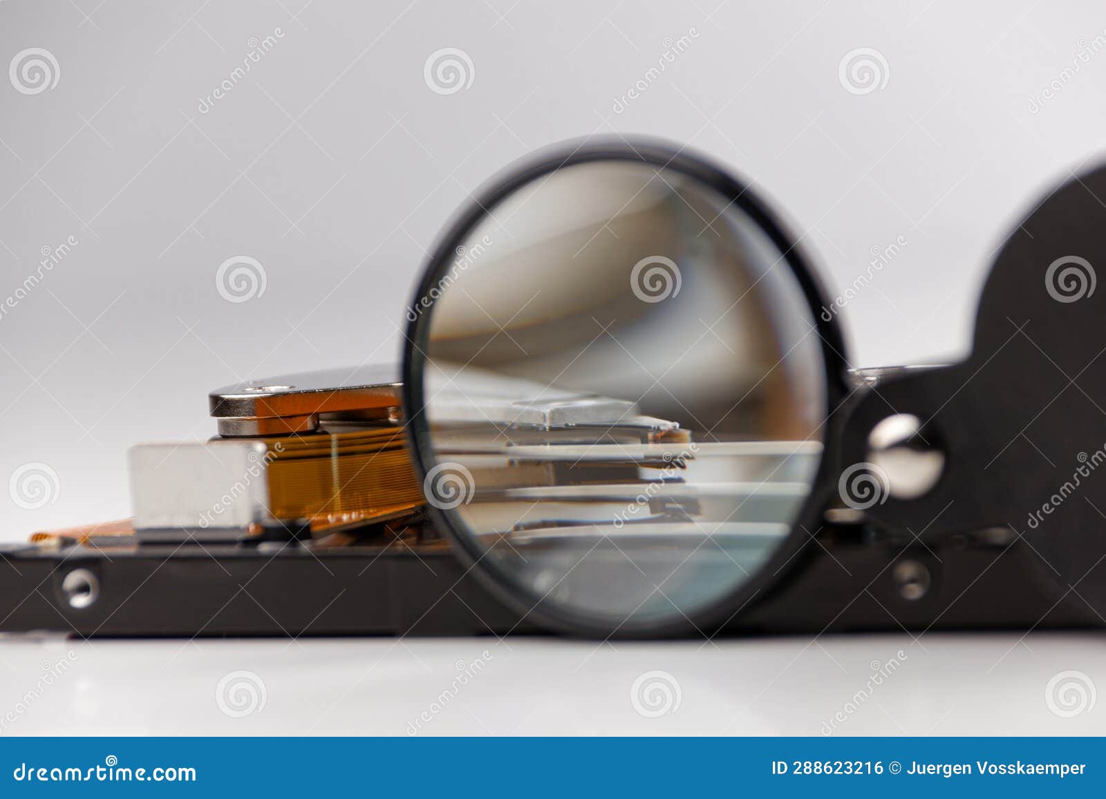 Hard Drive and Magnifying Glass, Representing the Process of Searching ...