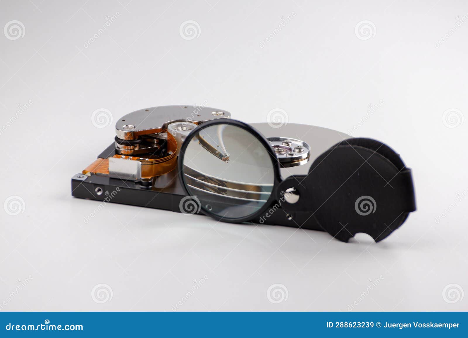 Hard Drive and Magnifying Glass, Representing the Process of Searching ...