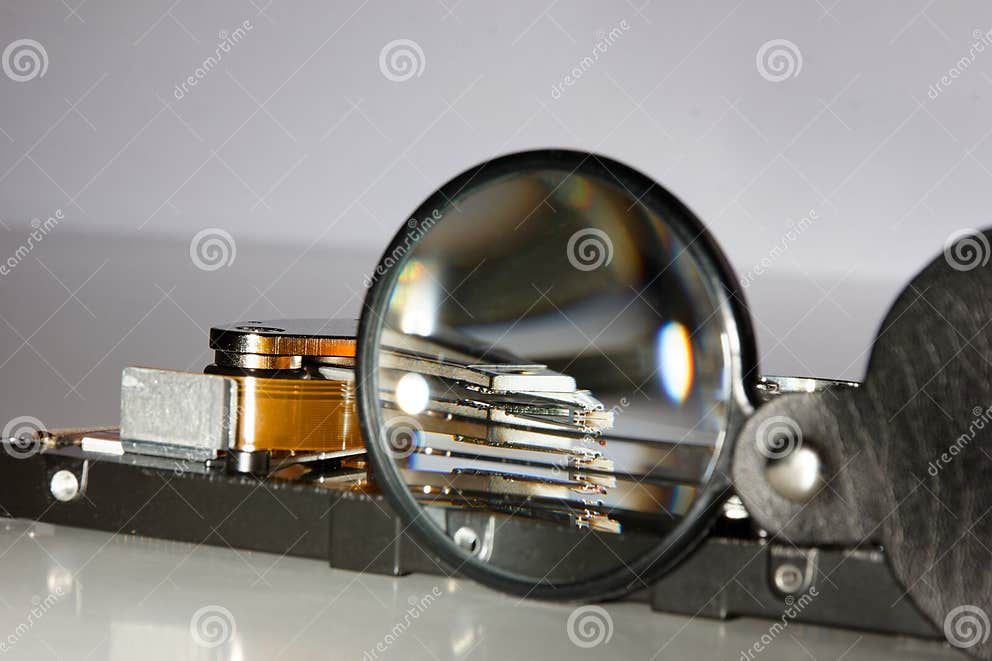 Hard Drive and Magnifying Glass, Representing the Process of Searching ...