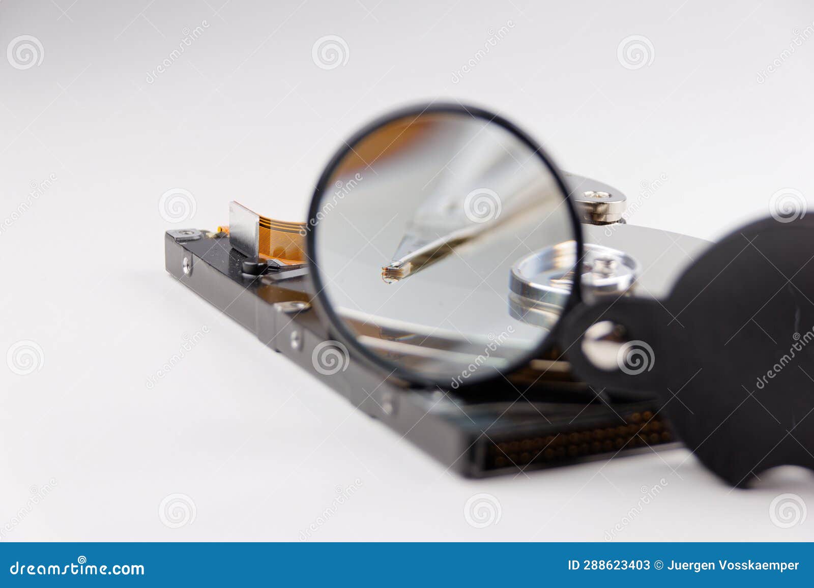 Hard Drive and Magnifying Glass, Representing the Process of Searching ...