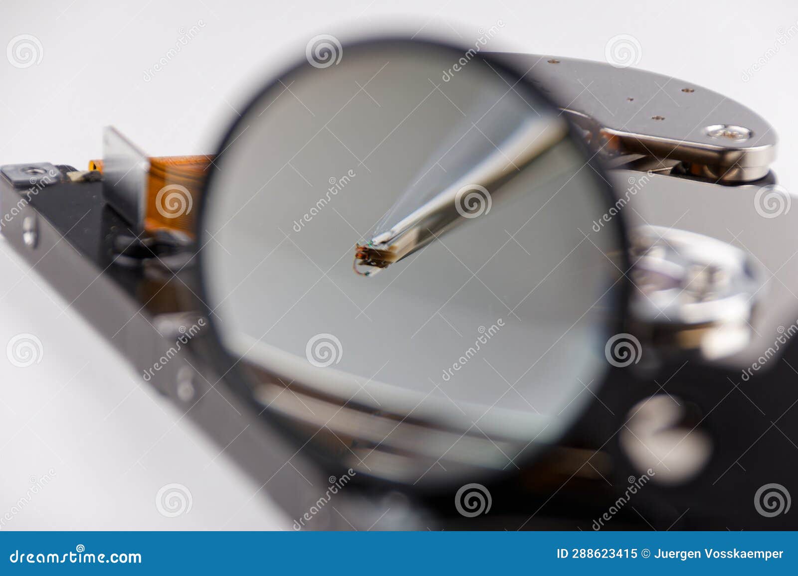 Hard Drive and Magnifying Glass, Representing the Process of Searching ...