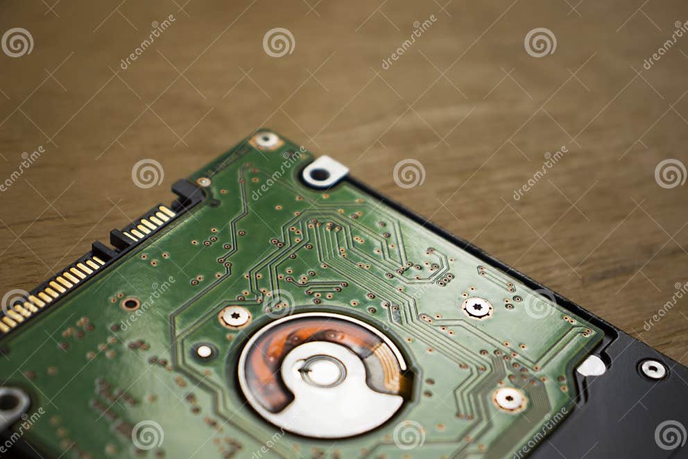 Hard drive on a table stock photo. Image of contacts - 218614854