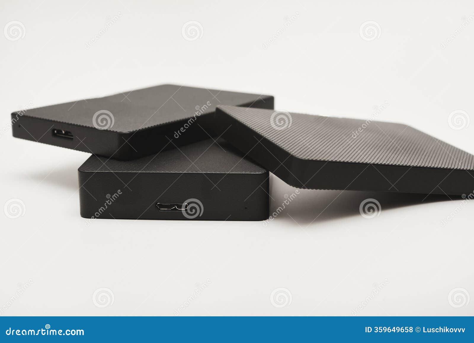 Hard Drives on a White Background. Modern Data Storage Devices with USB ...