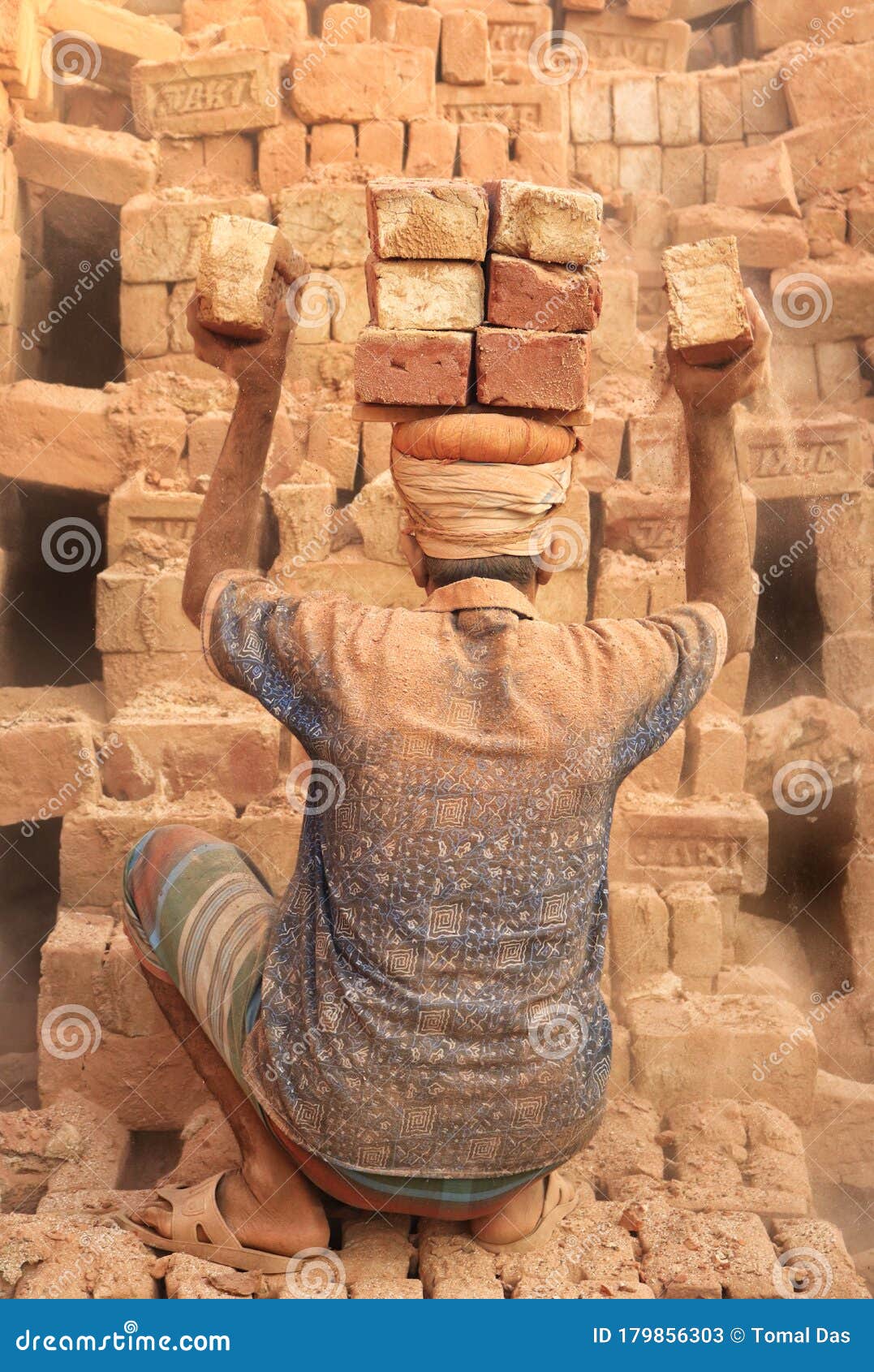 Hard work at brick field editorial stock photo. Image of brick - 179856303