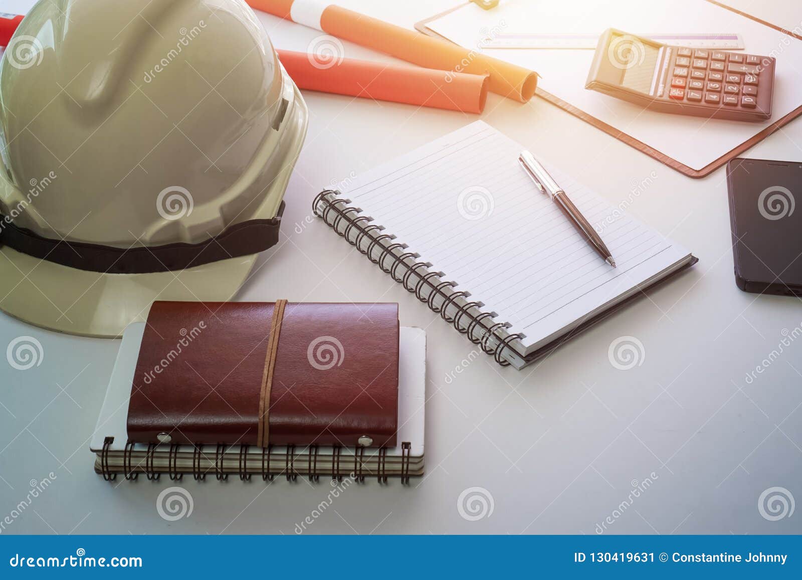Hard Safety Hat and Notepad on Working Desk. Stock Image - Image of ...