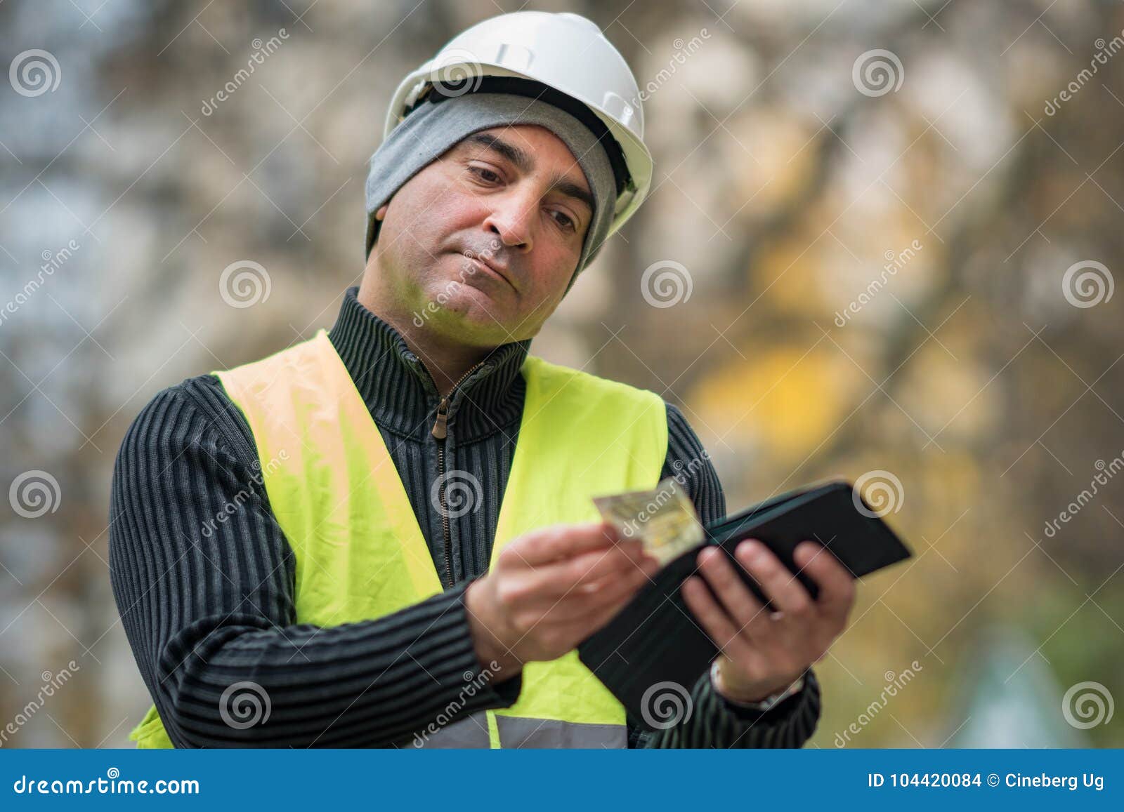 Hard Times: Poor Construction Worker and His Empty Wallet Stock Photo ...