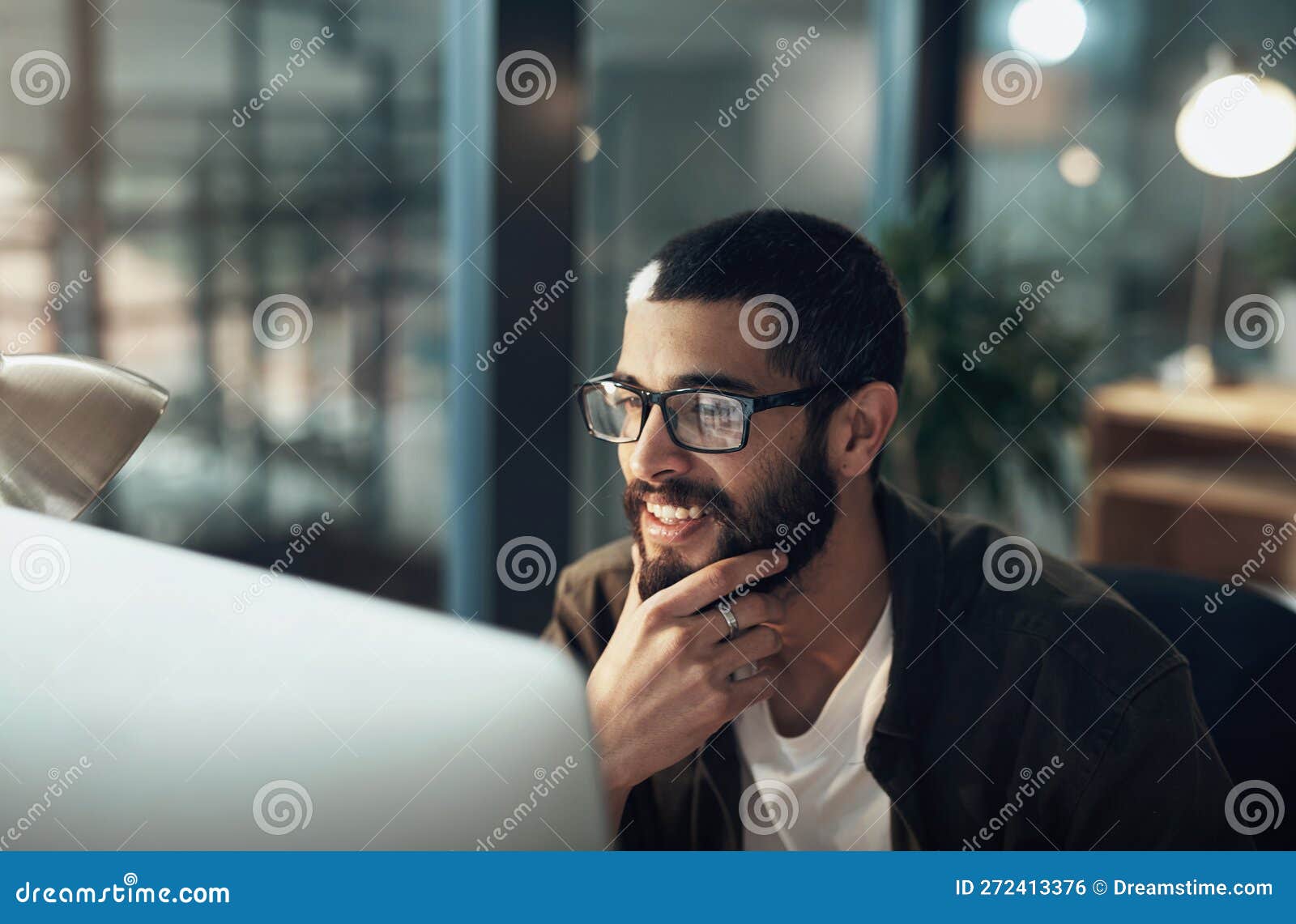 Hard Work is Good Work. a Young Businessman Using a Computer during a ...