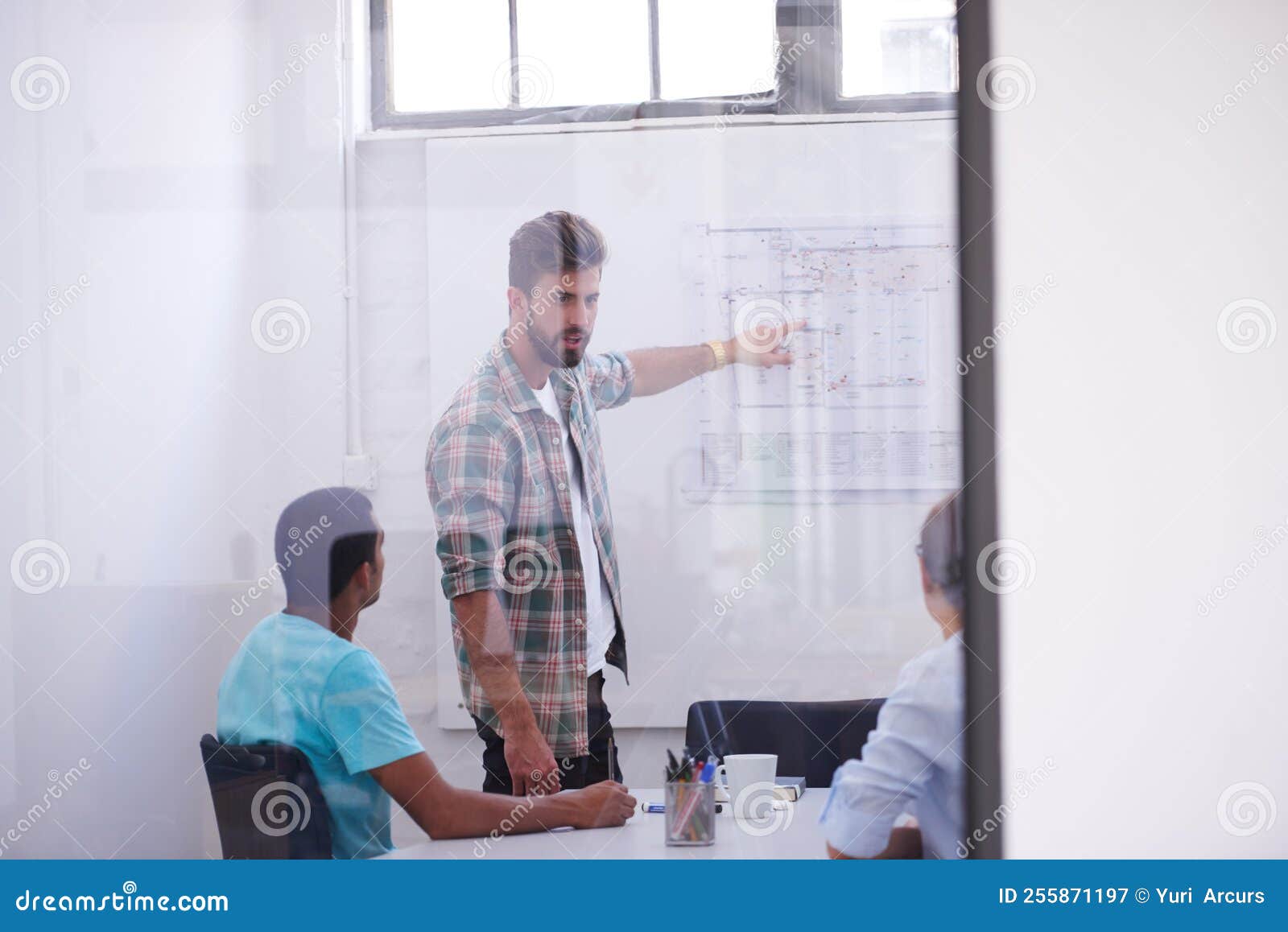 Hard at Work. a Handsome Young Man Working in His Office. Stock Image ...