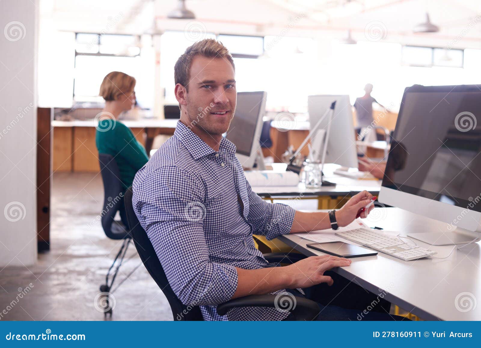Hard at Work. a Handsome Young Man Working in His Office. Stock Image ...