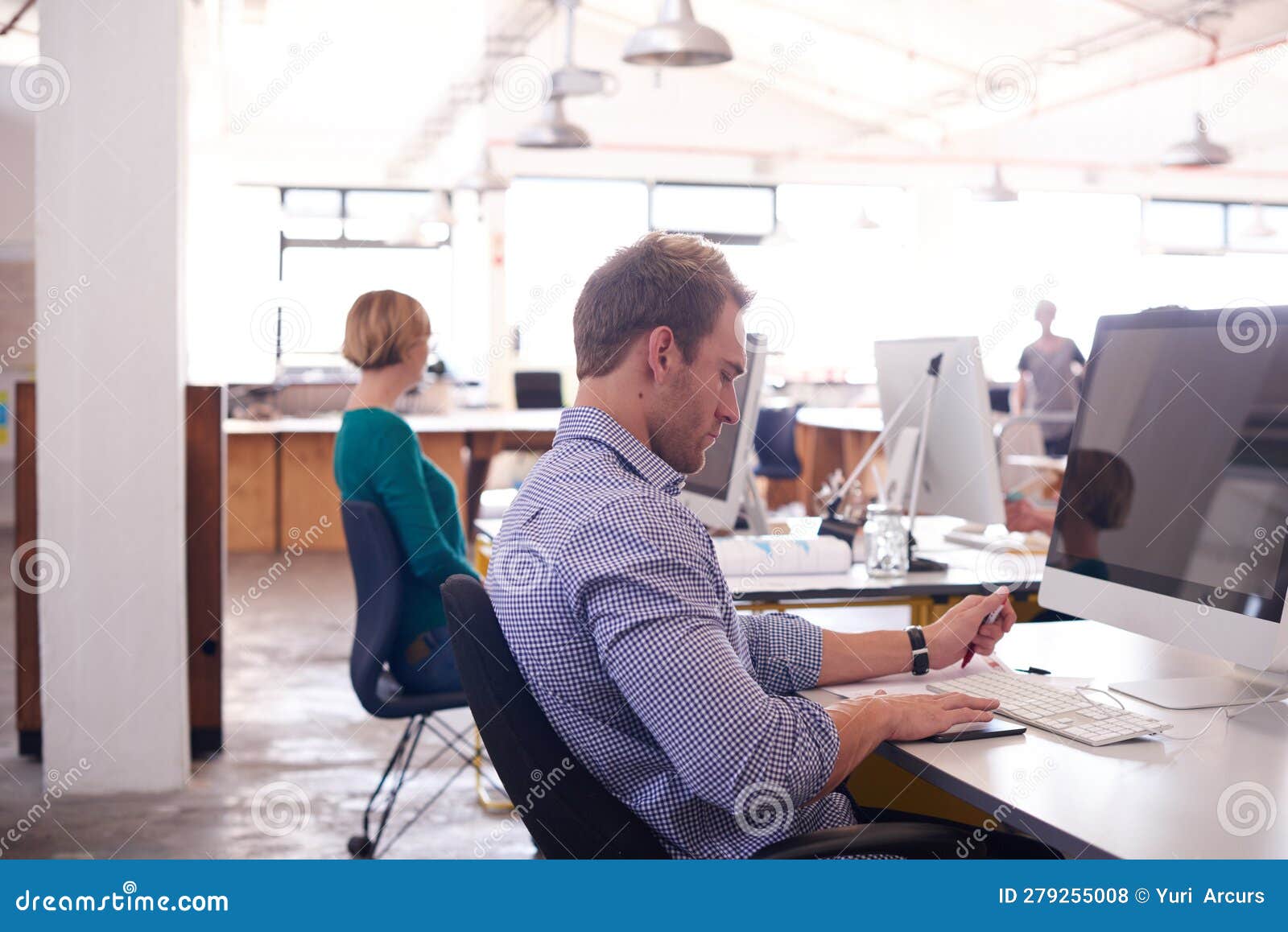 Hard at Work. a Handsome Young Man Working in His Office. Stock Photo ...