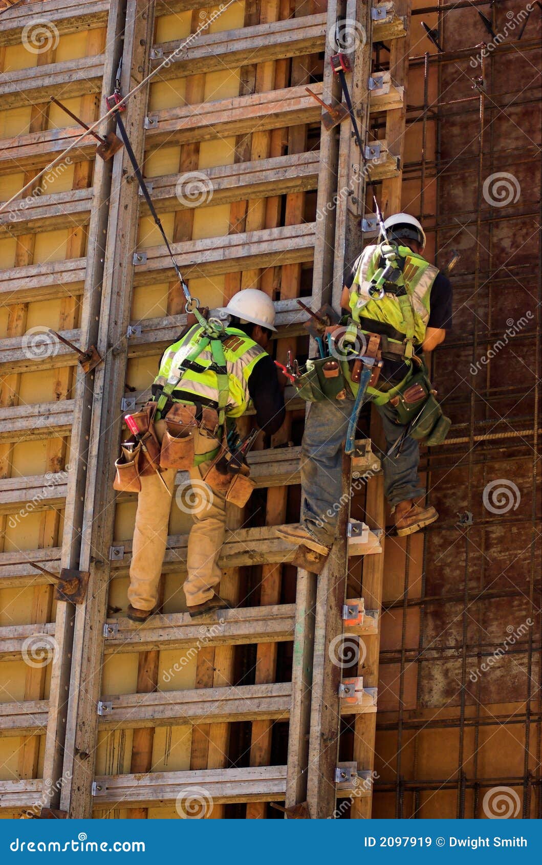 Hard Work on a High Wall stock image. Image of outdoor - 2097919