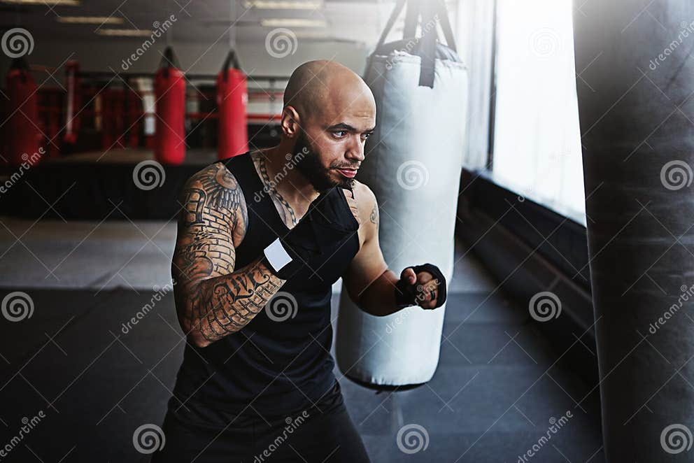Hard Work Pays. a Kick-boxer Training in a Gym. Stock Photo - Image of ...