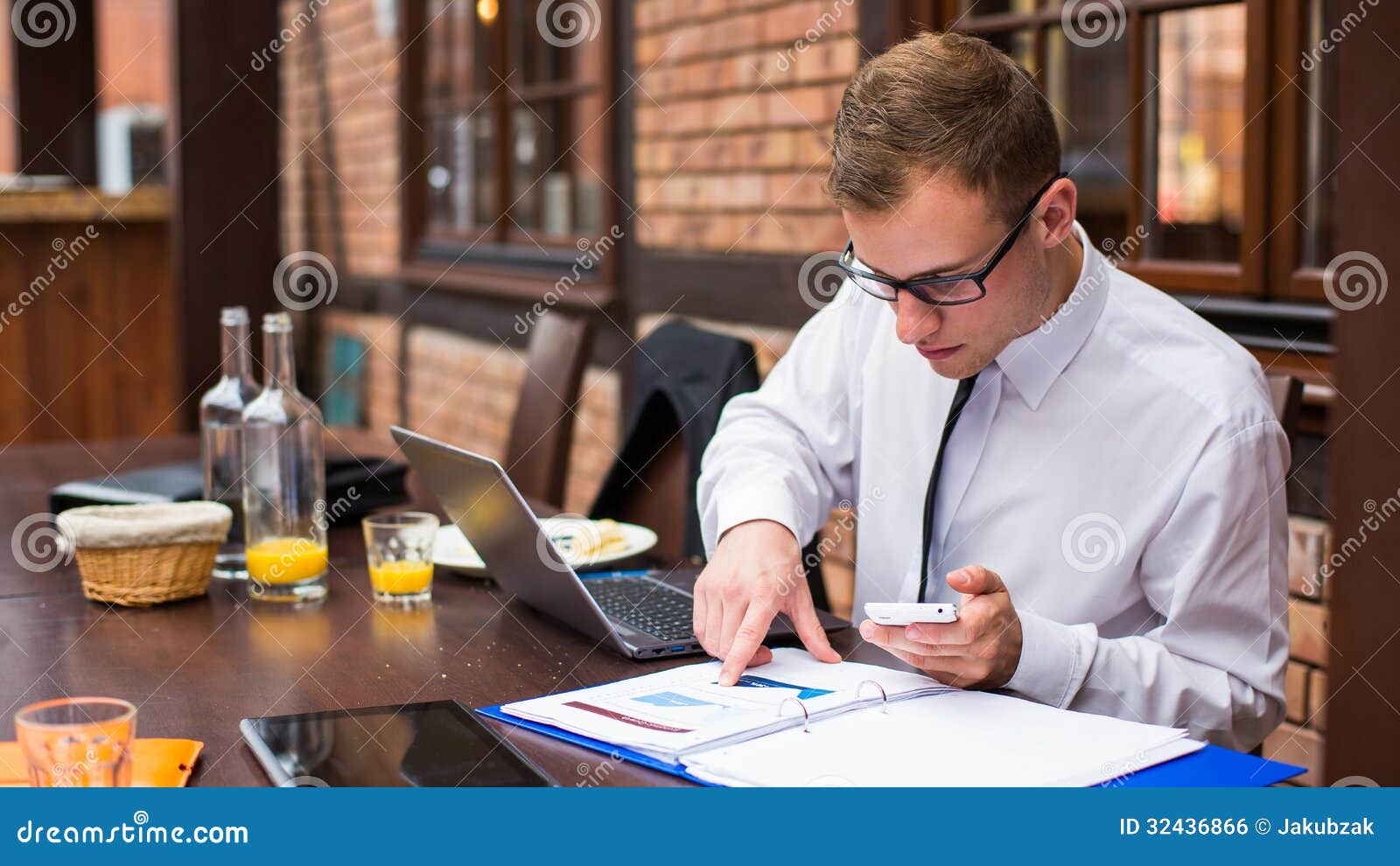 Hard Working Businessman in Restaurant. Stock Photo - Image of ...