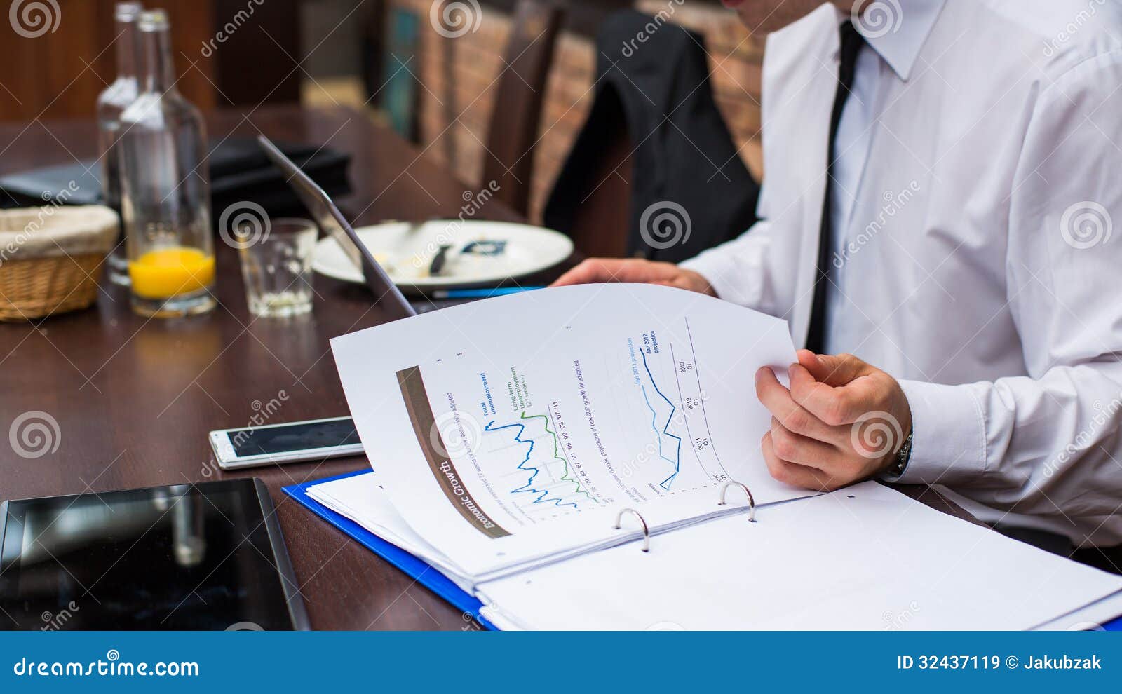 Hard Working Businessman in Restaurant. Stock Image - Image of ...