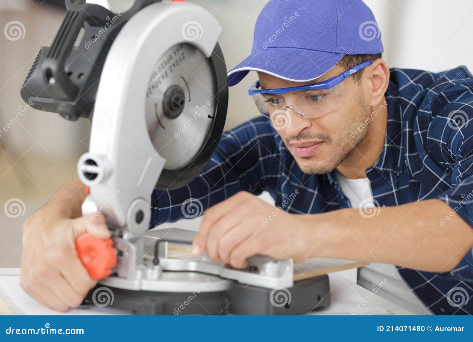 Hard Working Carpenter Cutting Wooden Plank Stock Photo - Image of ...