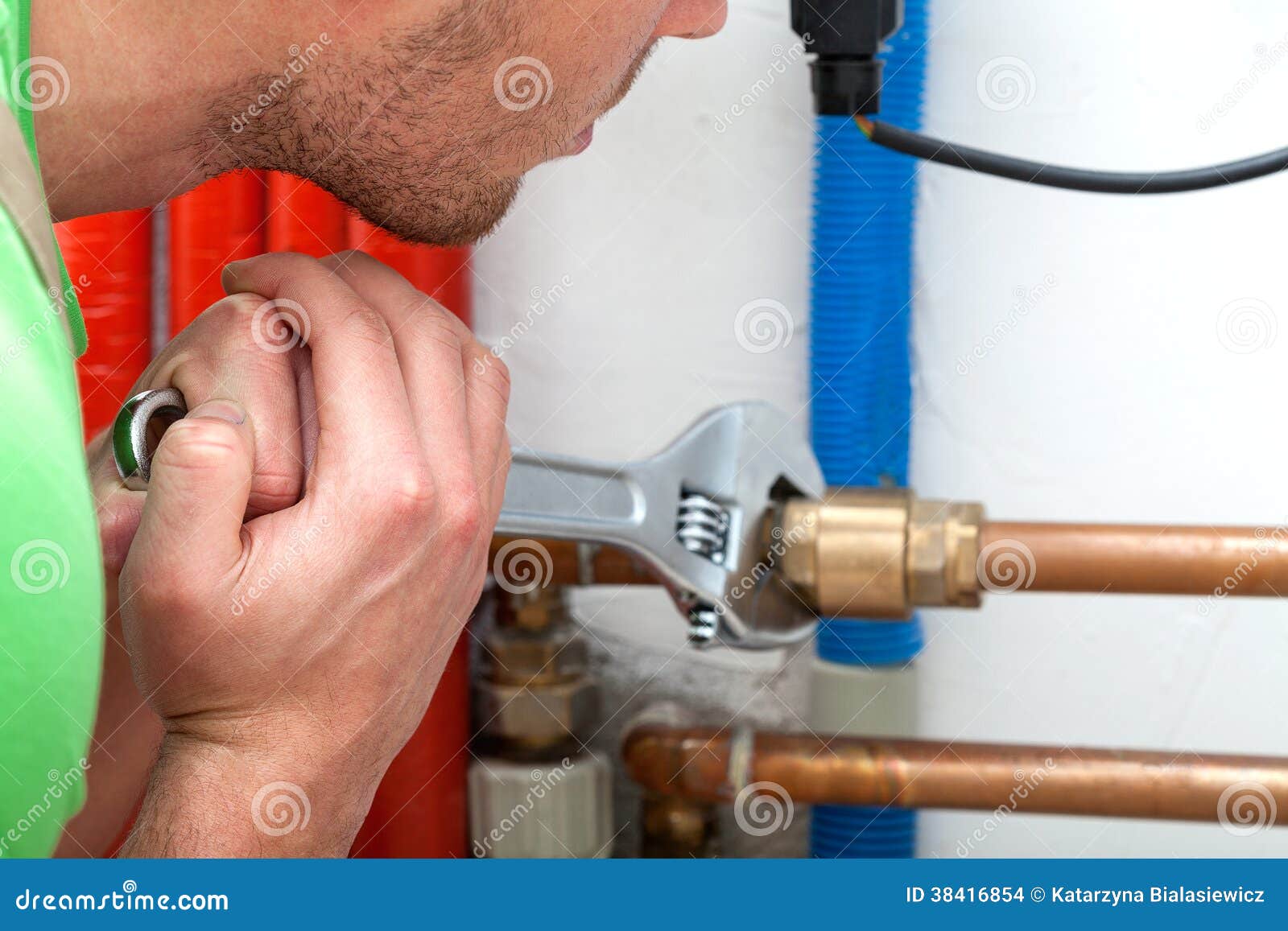 Hard working plumber stock photo. Image of equipment - 38416854