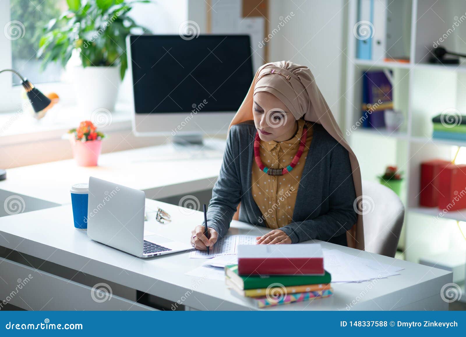 Busy Teacher Sitting at the Table and Preparing Lesson Stock Photo ...