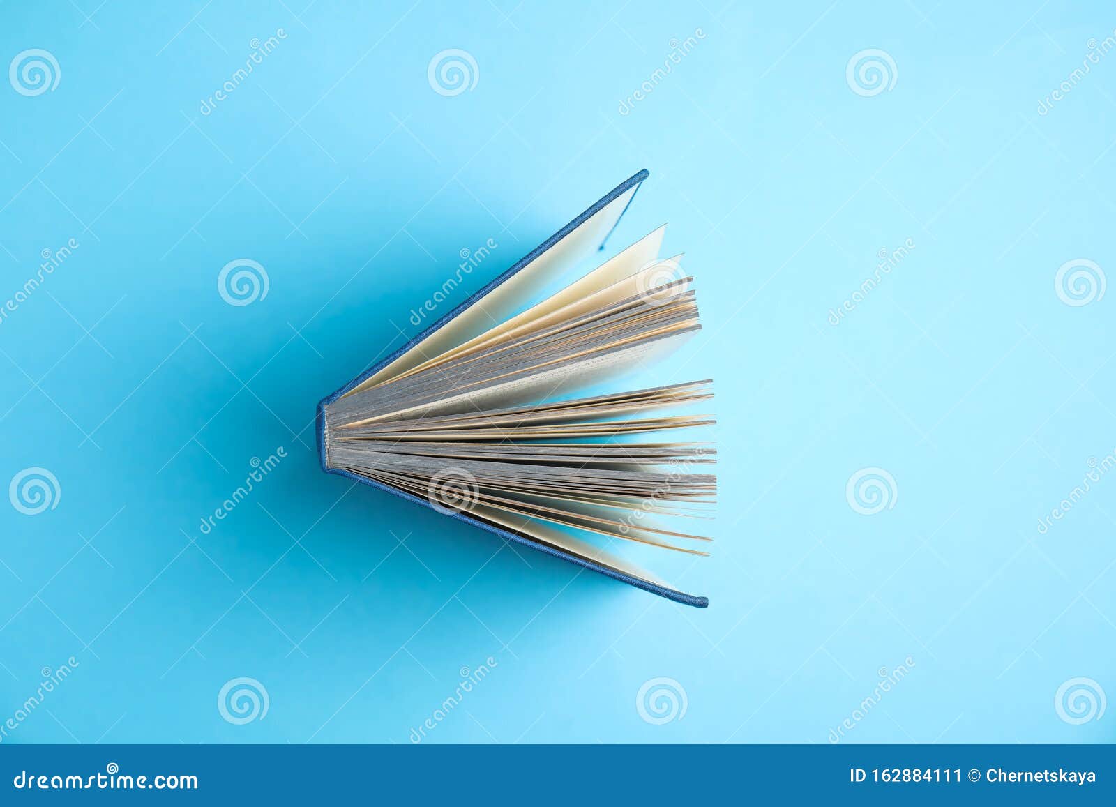Hardcover Book on Light Blue Background Stock Image - Image of ...