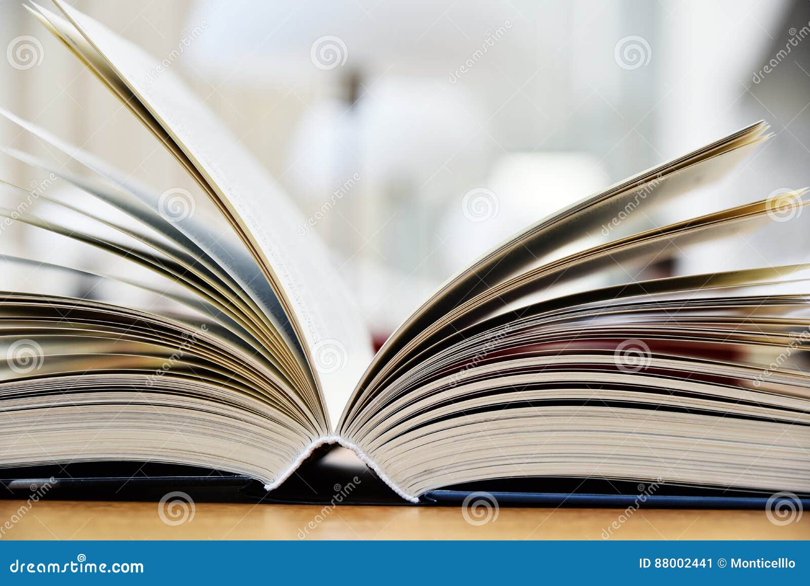Hardcover Book Lying on the Table in the Library Stock Image - Image of ...