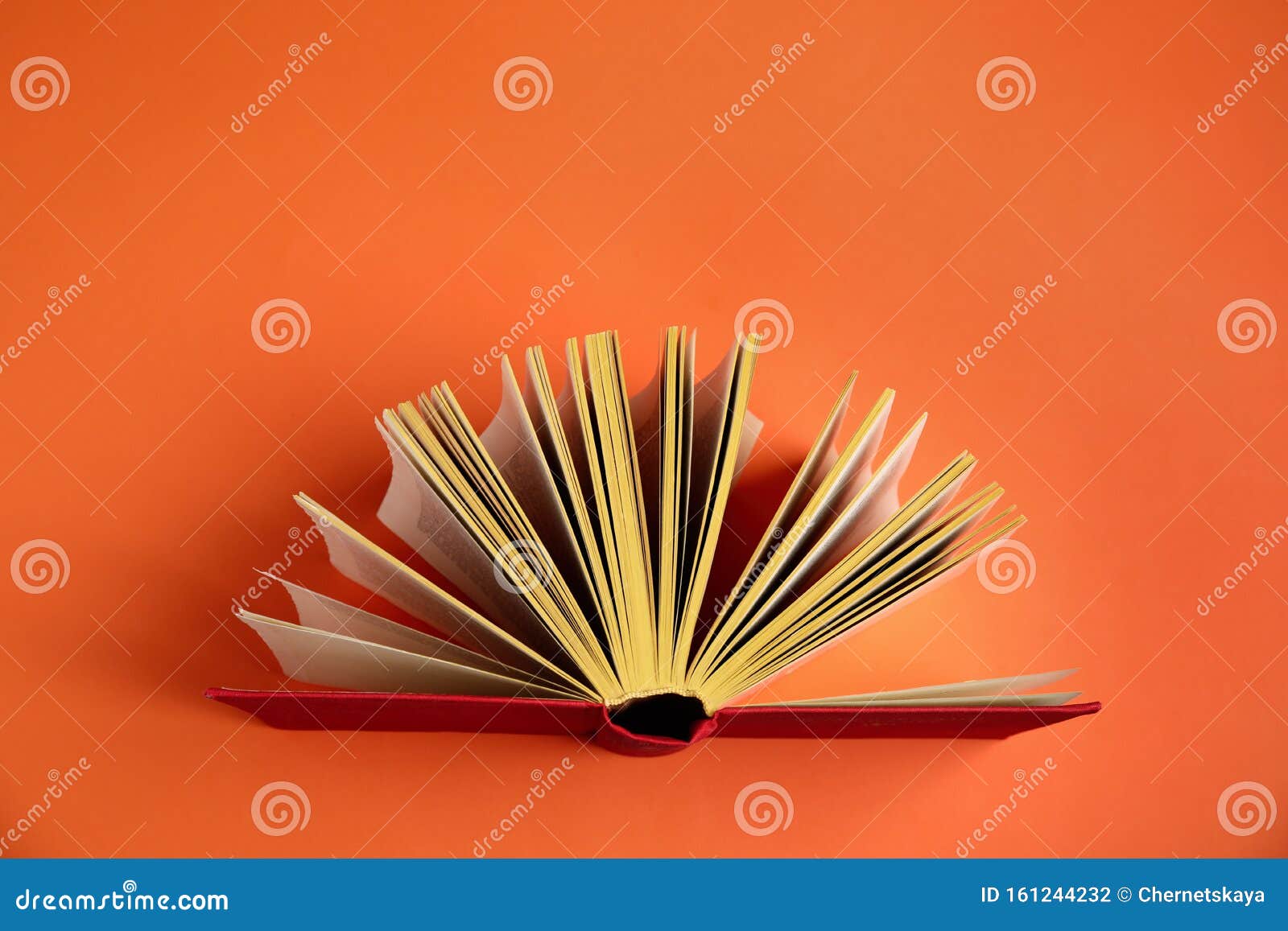 Hardcover Book on Orange Background Stock Photo - Image of classic ...