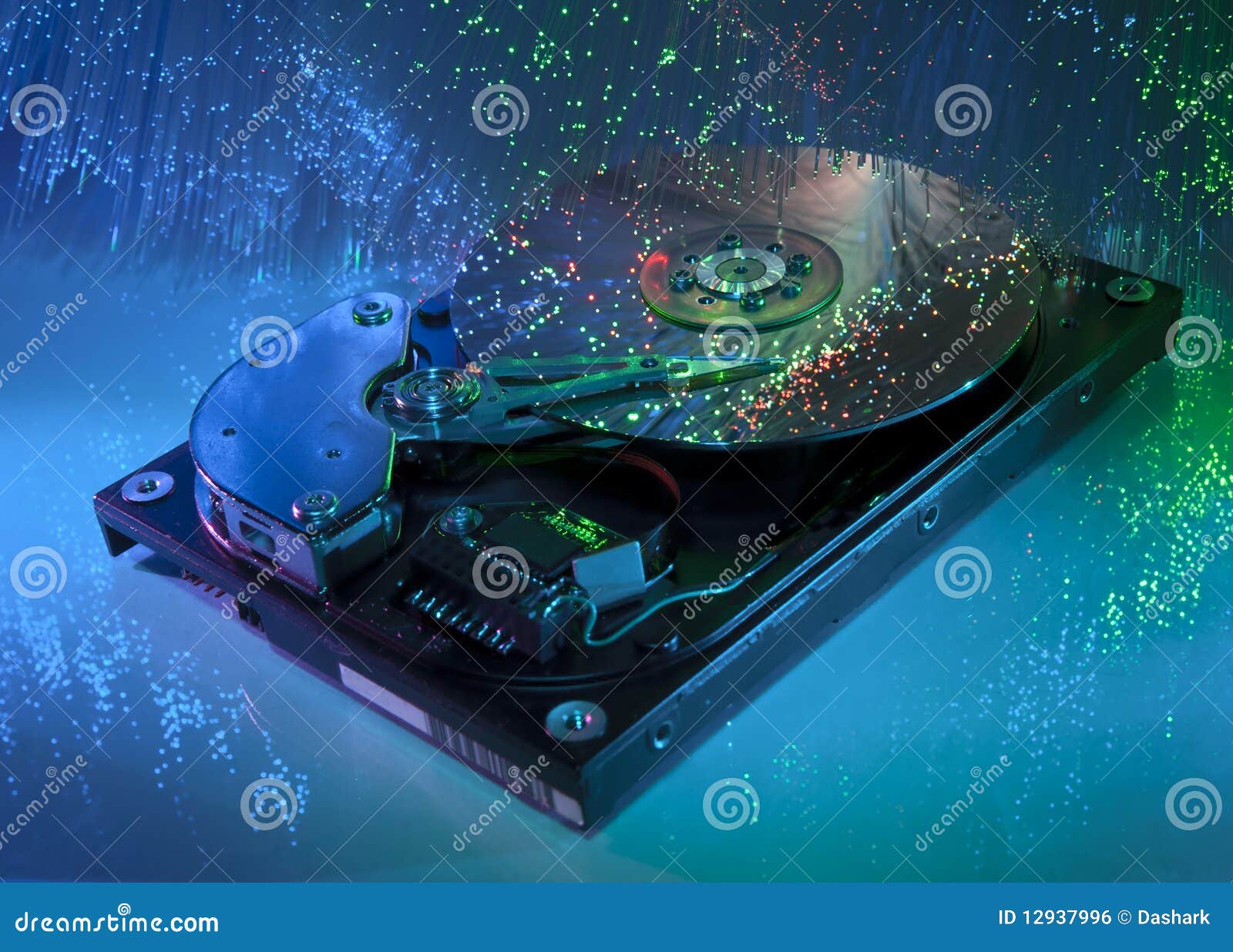Harddisk with Fiber Optical Background Stock Photo - Image of ...