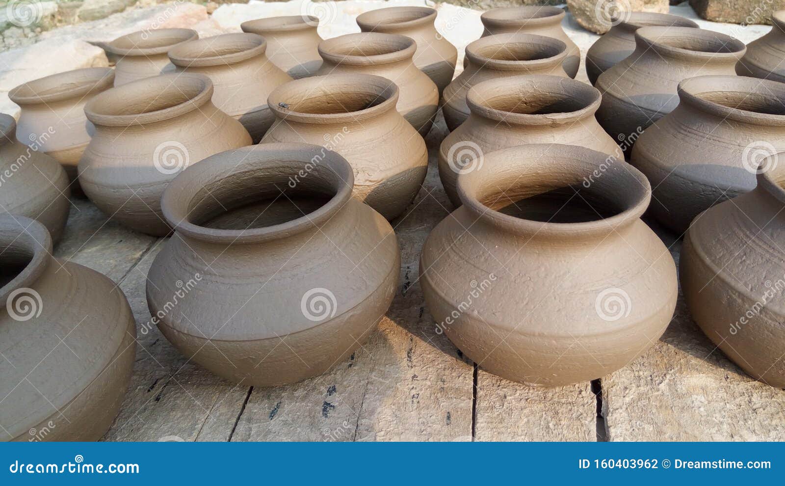Drying Earthen Pots in Sunlight. Stock Photo - Image of dried, drying ...