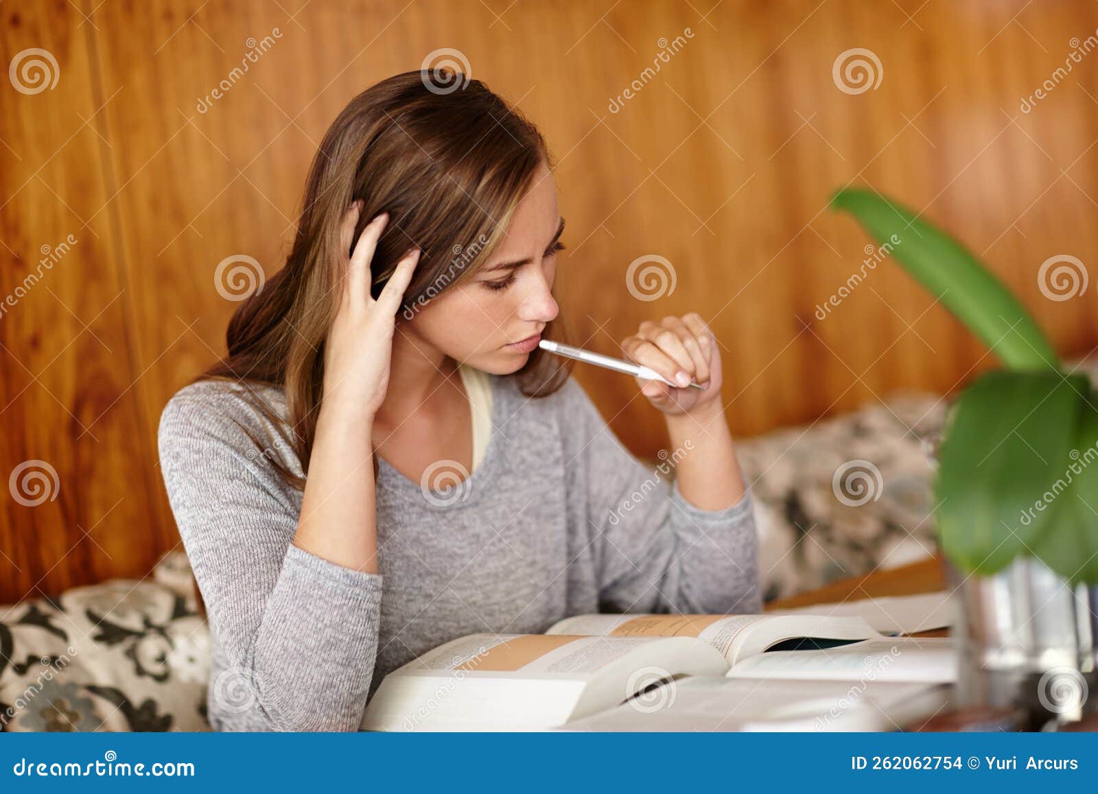 This is Harder Than I Thought. a Young Student Hard at Work Preparing ...