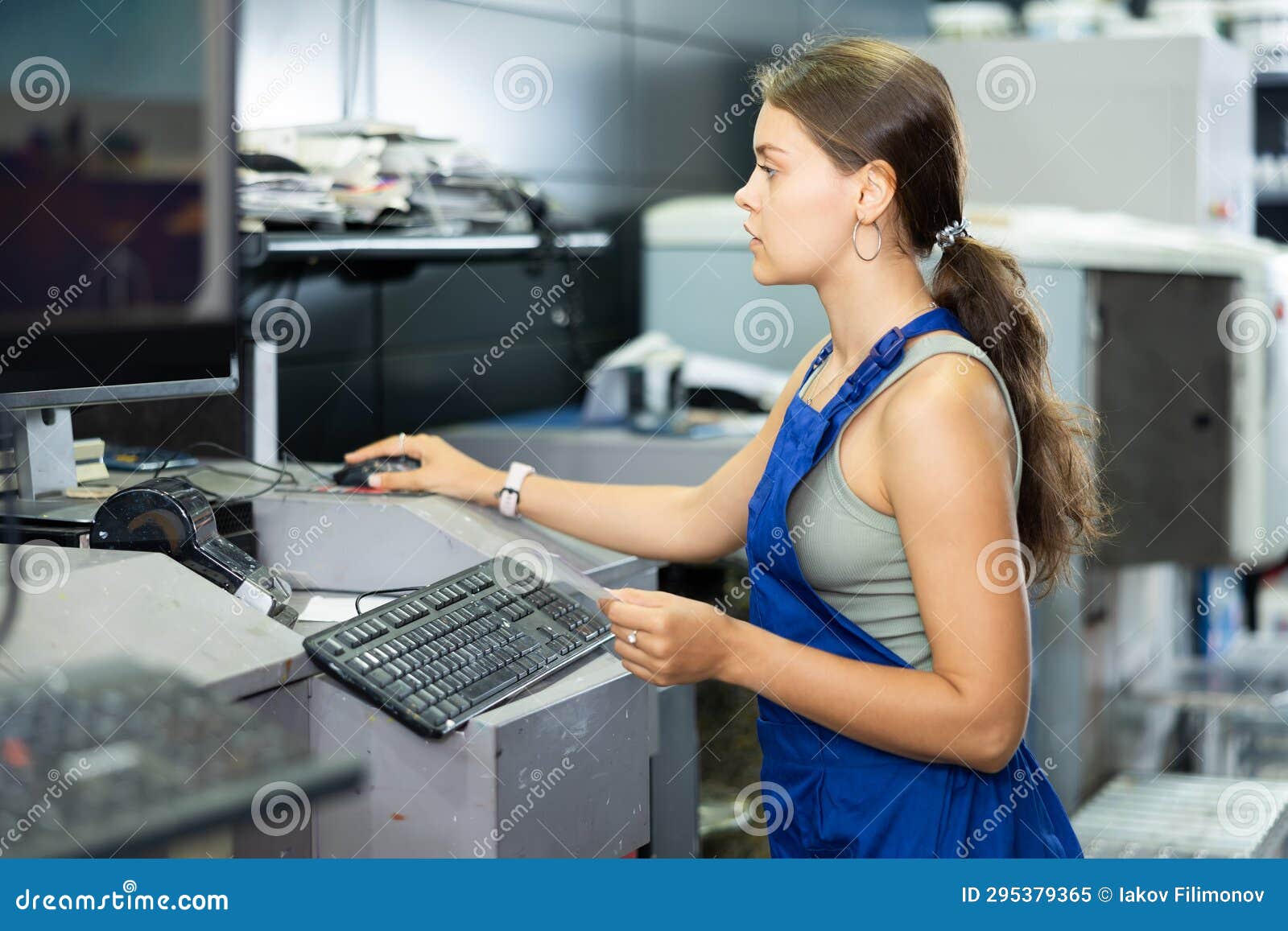 Hardware Store Employee Combining Just the Right Tints of Paint in an ...