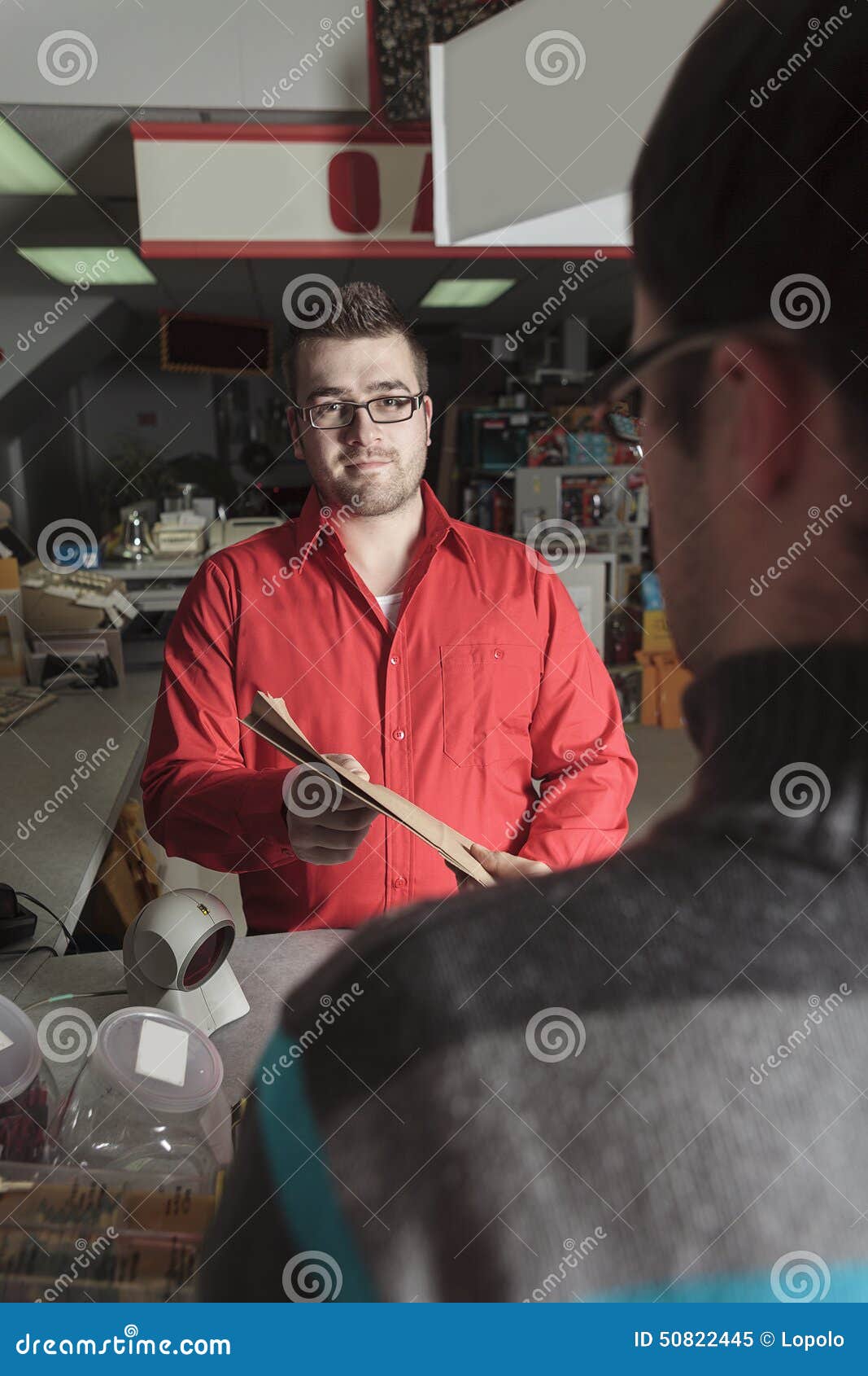 Hardware store employee stock image. Image of megastore - 50822445