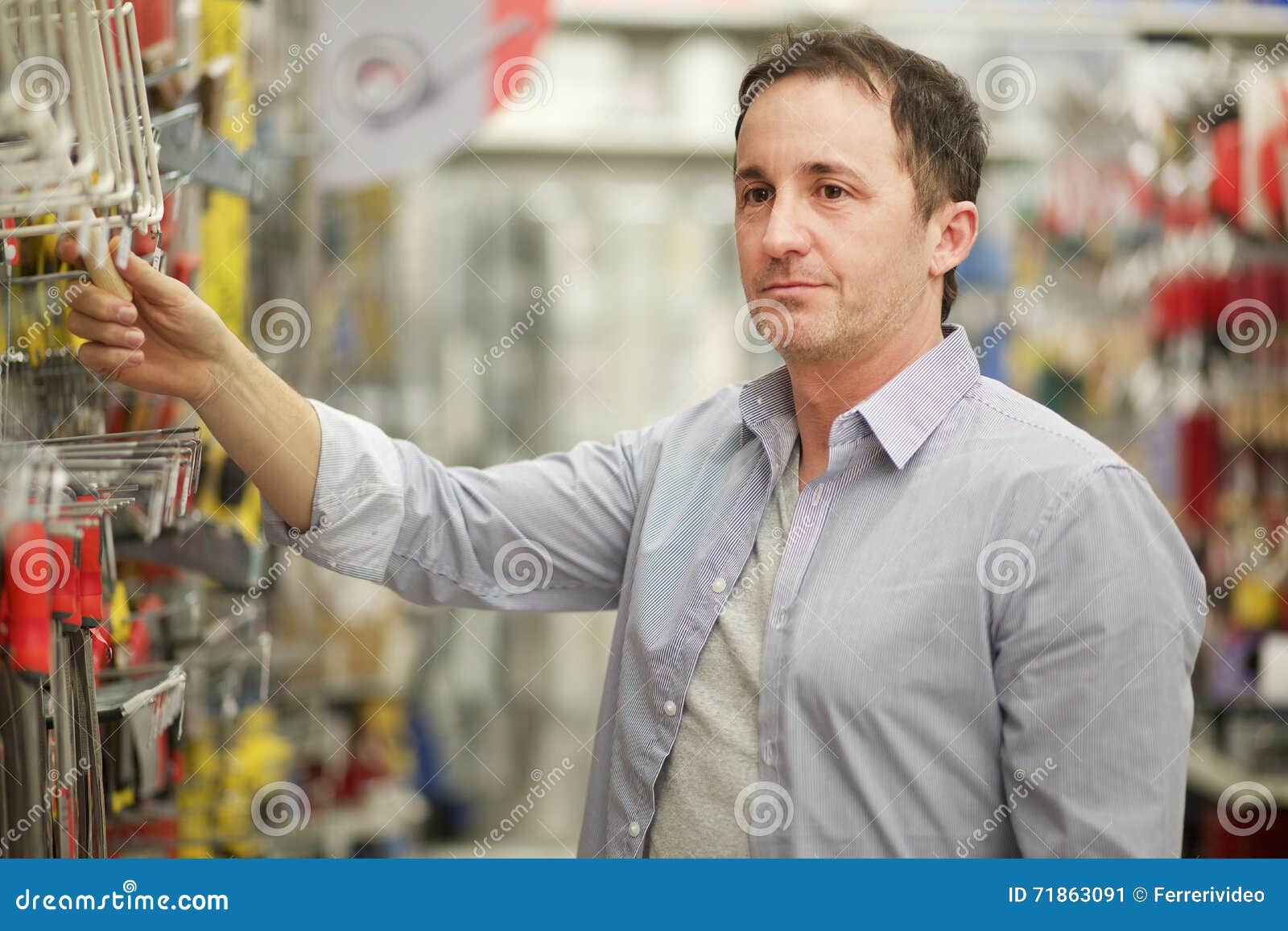 Hardware store stock image. Image of male, crossed, orange - 71863091