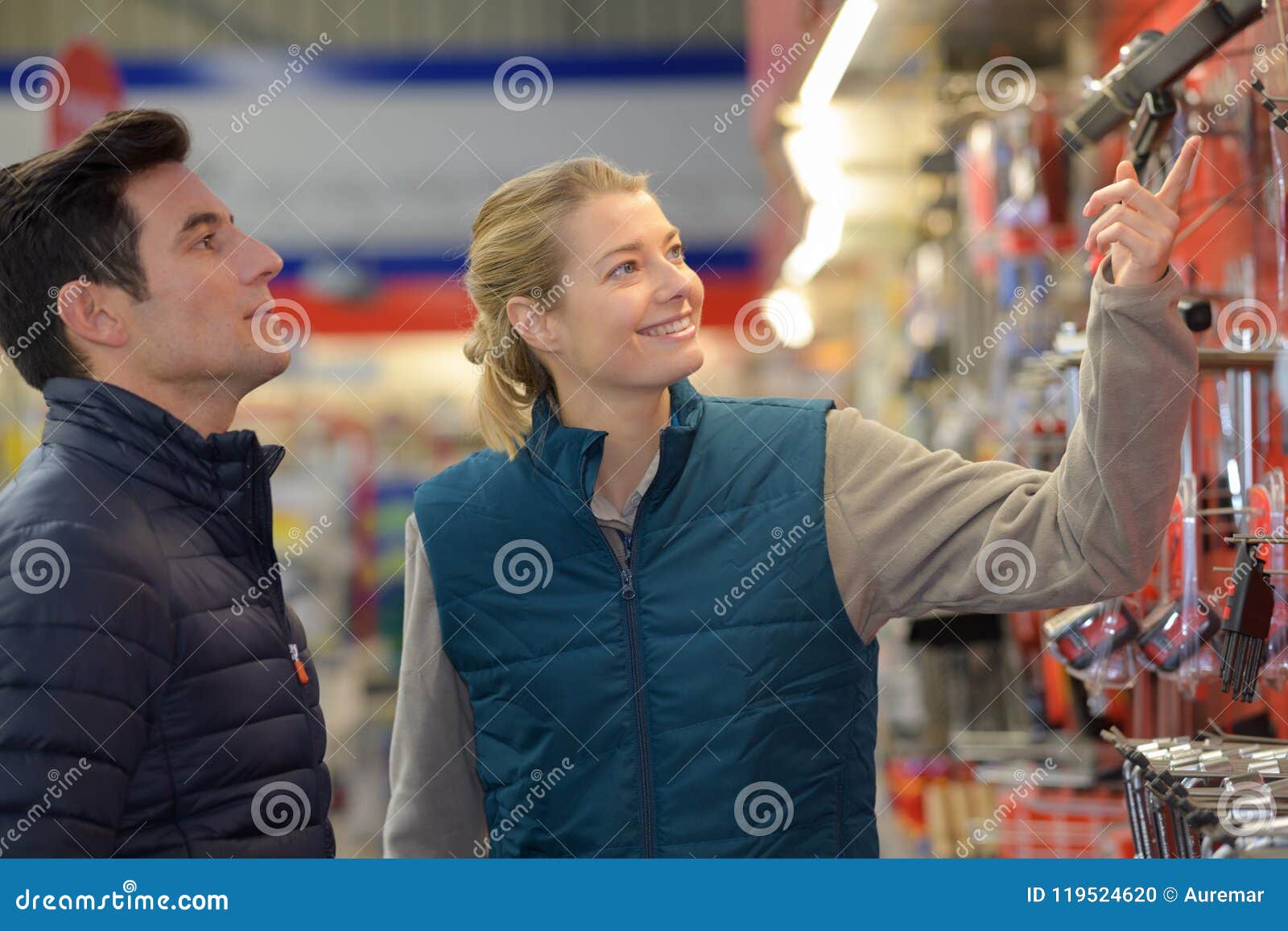 Hardware Store Worker Assisting Customer Stock Photo - Image of client ...