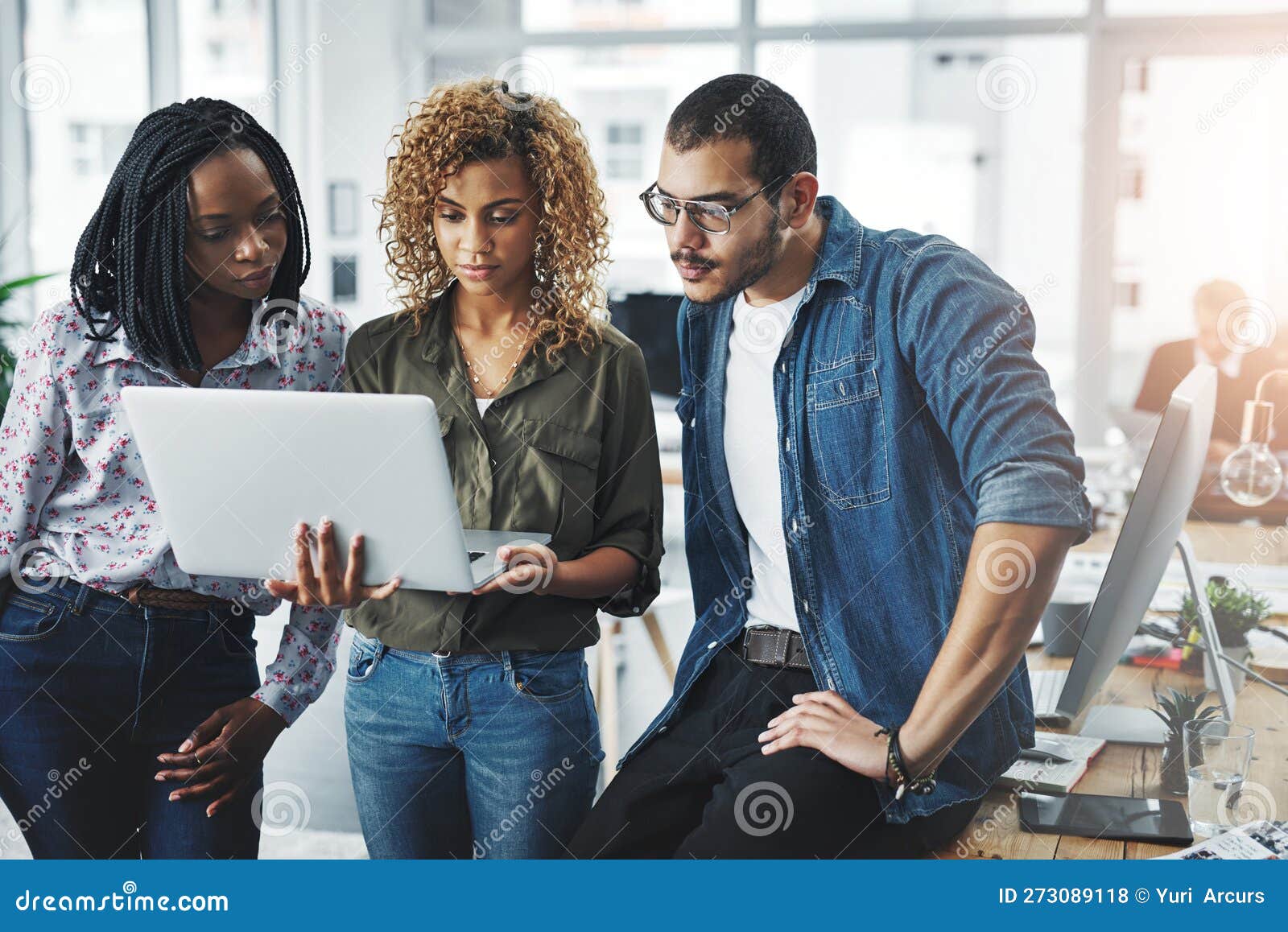 Hardworking Teams are Winning Teams. a Group of Colleagues Using a ...