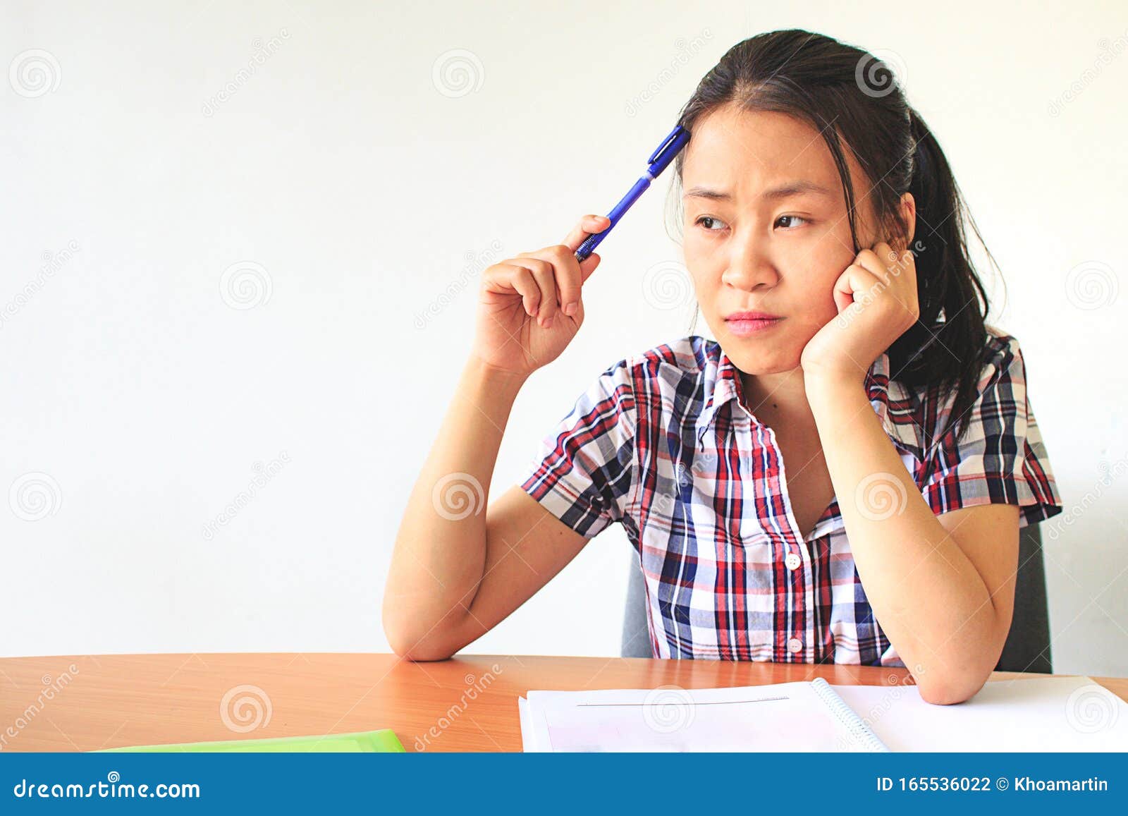 Hardworking University Student Thinking Solution for Assignment in ...