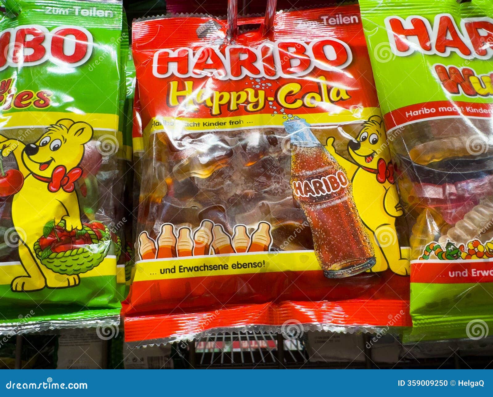 HARIBO Candy Bags Displayed On A Blue Cardboard Shelf, Showing The ...