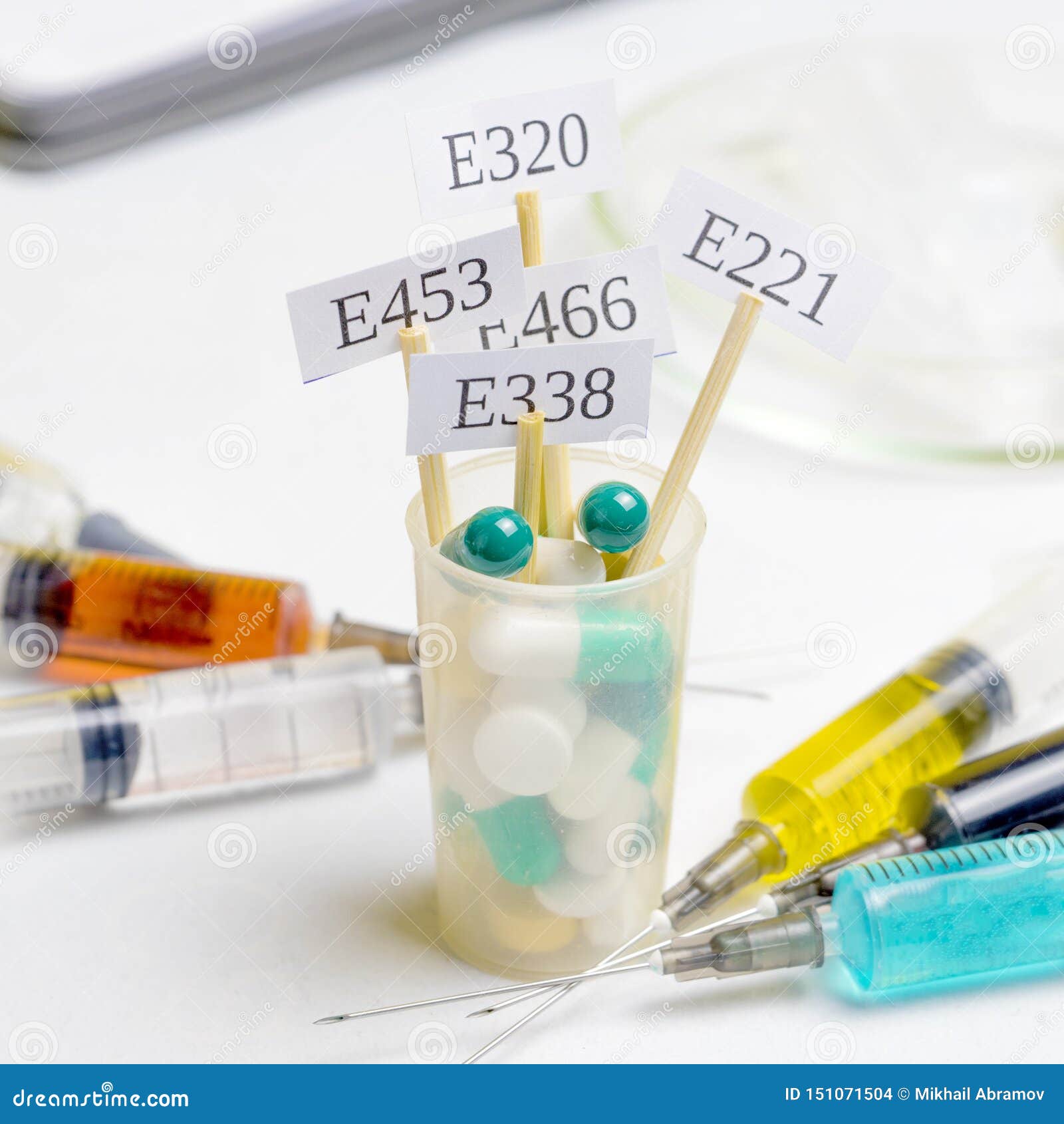 Harmful Food Additives. in a Glass with Multi-colored Pills are Plates ...