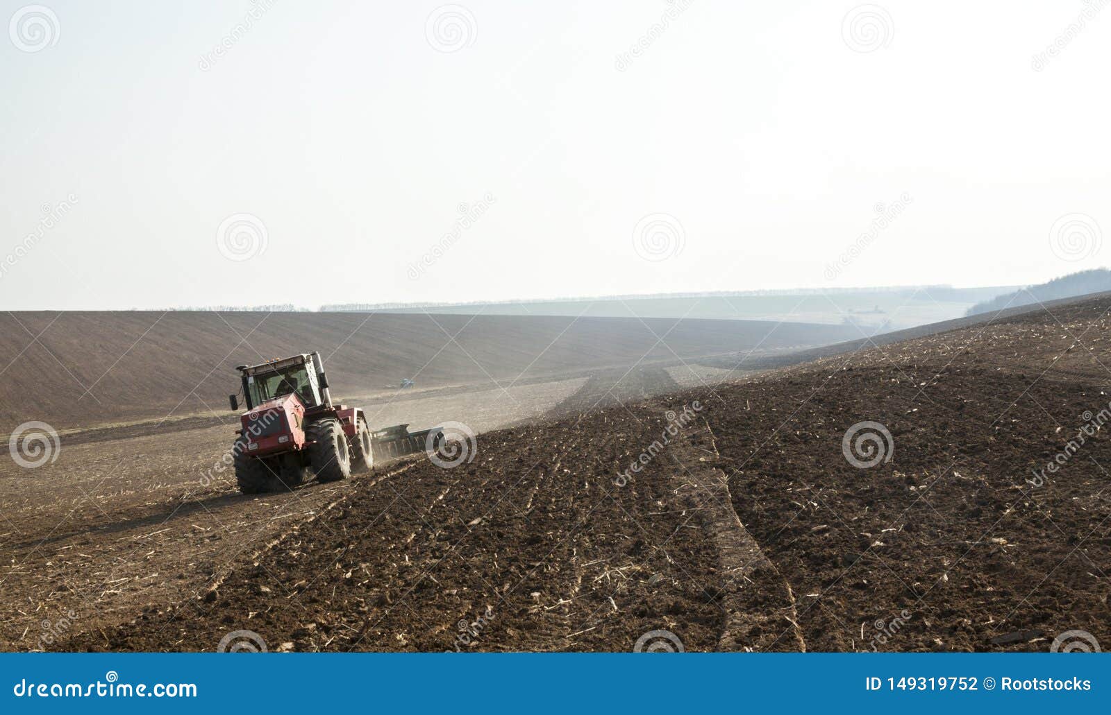 Harrowing the Soil with Disc Harrows Stock Photo - Image of dirt ...