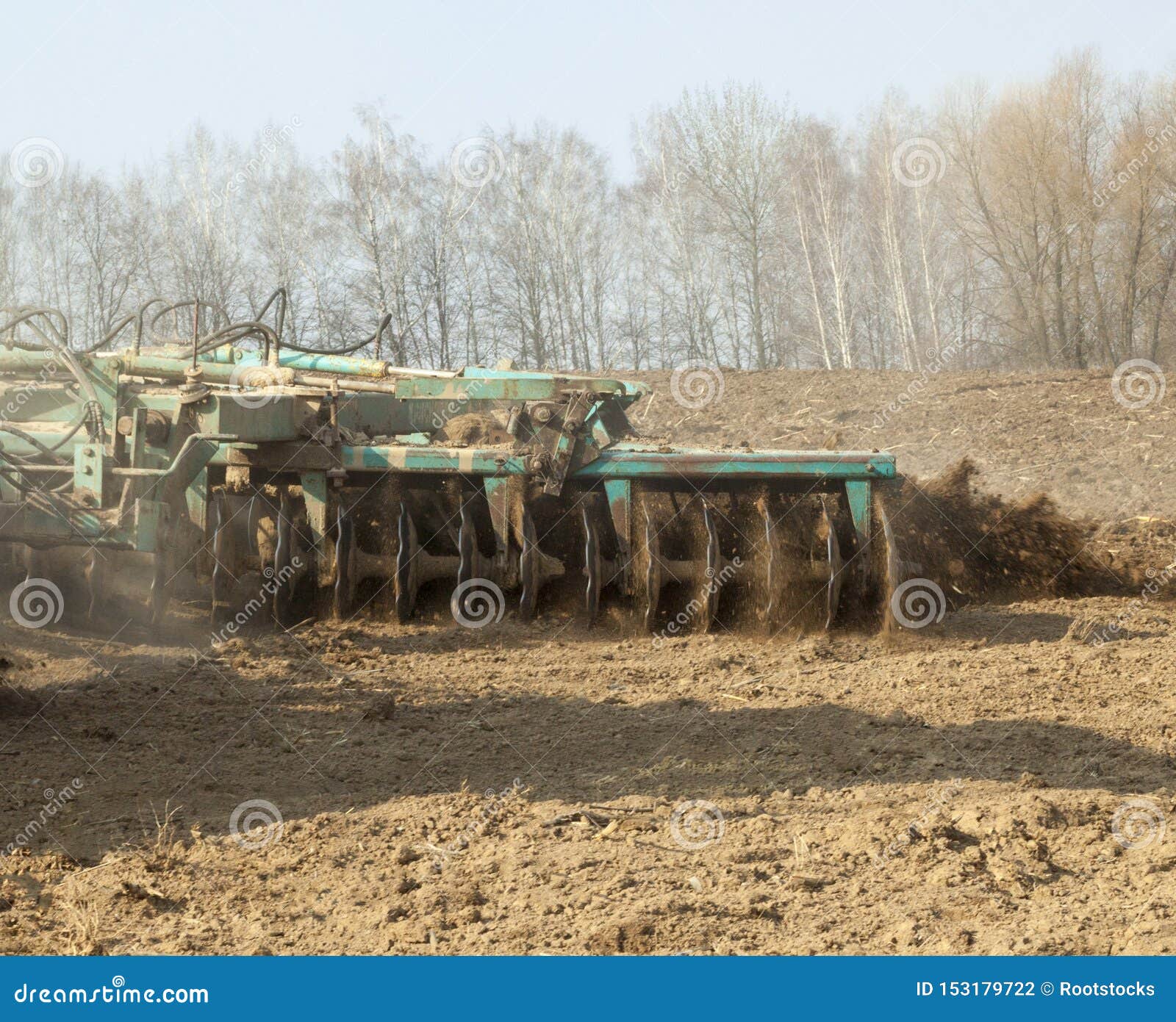 Harrowing the Soil with Disc Harrows Stock Photo - Image of cultivate ...