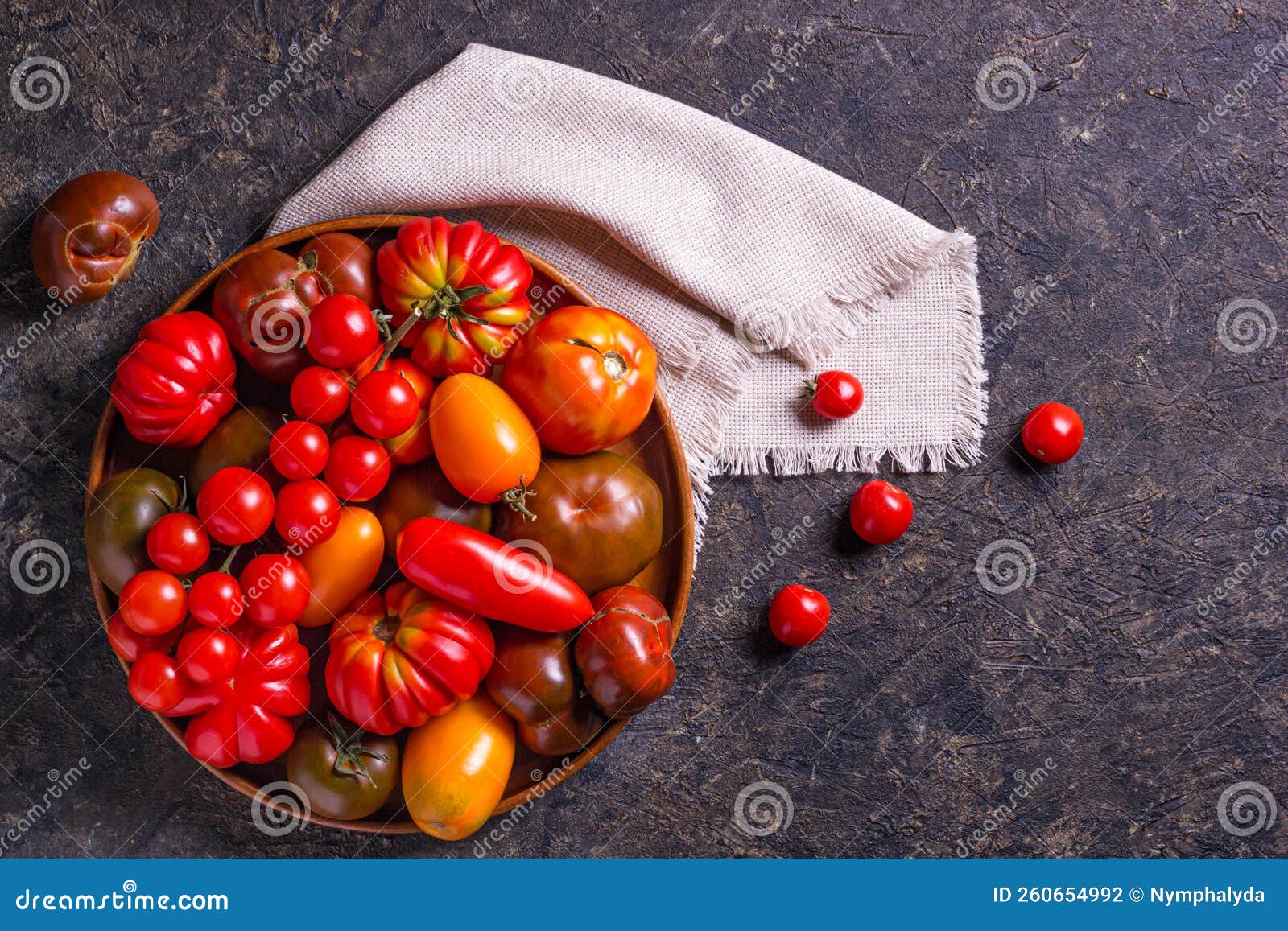 The Harvest of Assorted Tomatoes. Colorful Organic Tomatoes on a Large ...