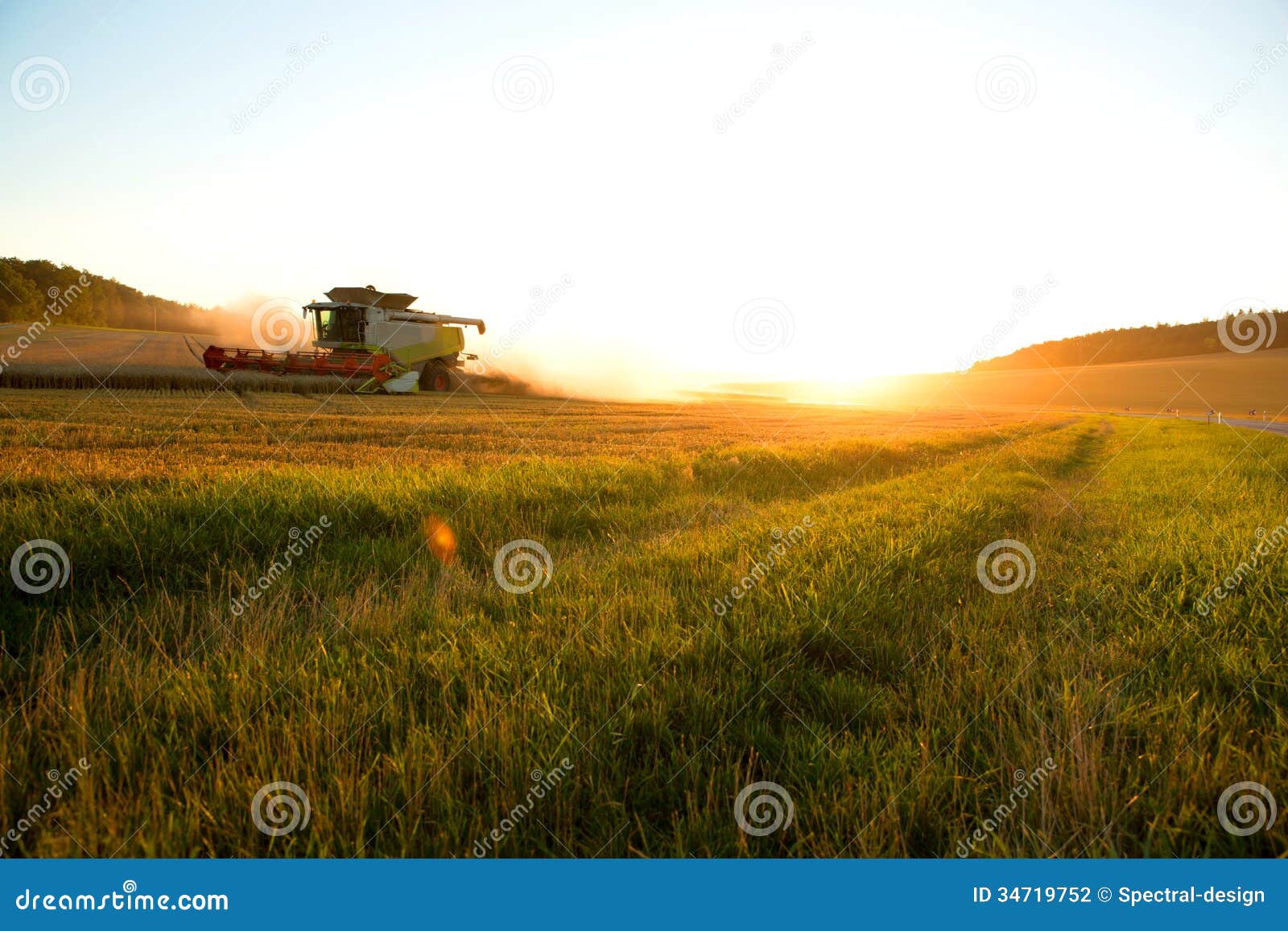 Harvest in the sunset stock photo. Image of machine, food - 34719752