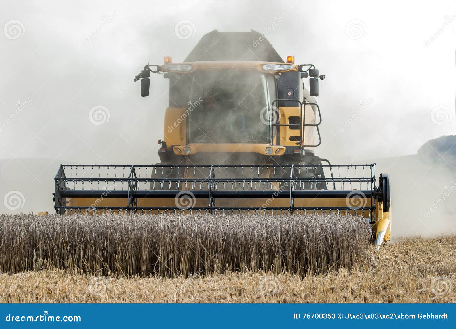 Harvester in corn field stock image. Image of combine - 76700353