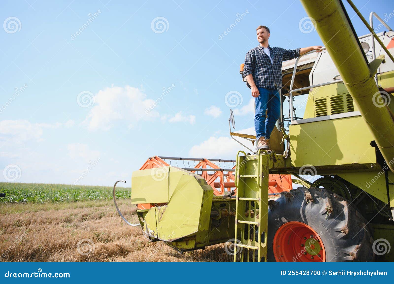 Harvester Machine Driver Climbing Into A Cab To Harvest His Wheat Field Farmer Getting In