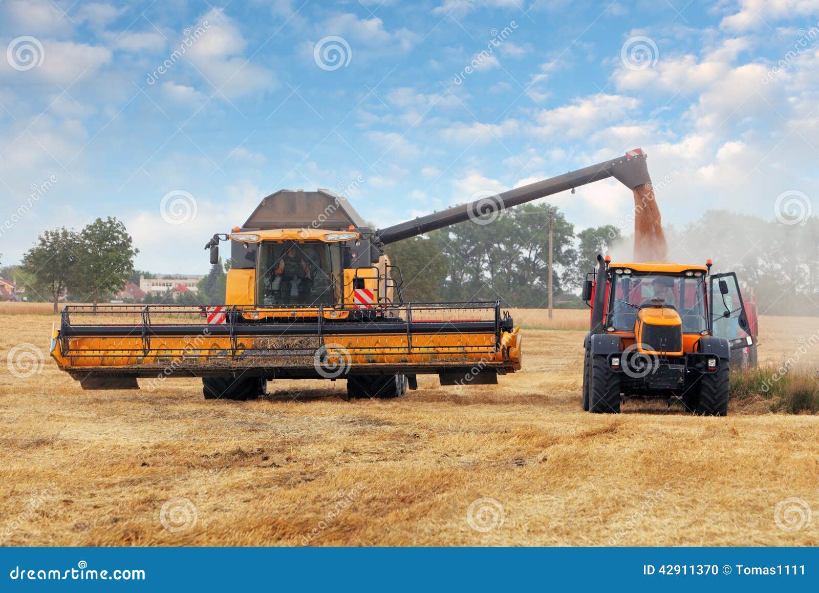 Harvester Machine and Tractor at Harvest Stock Photo - Image of combine ...