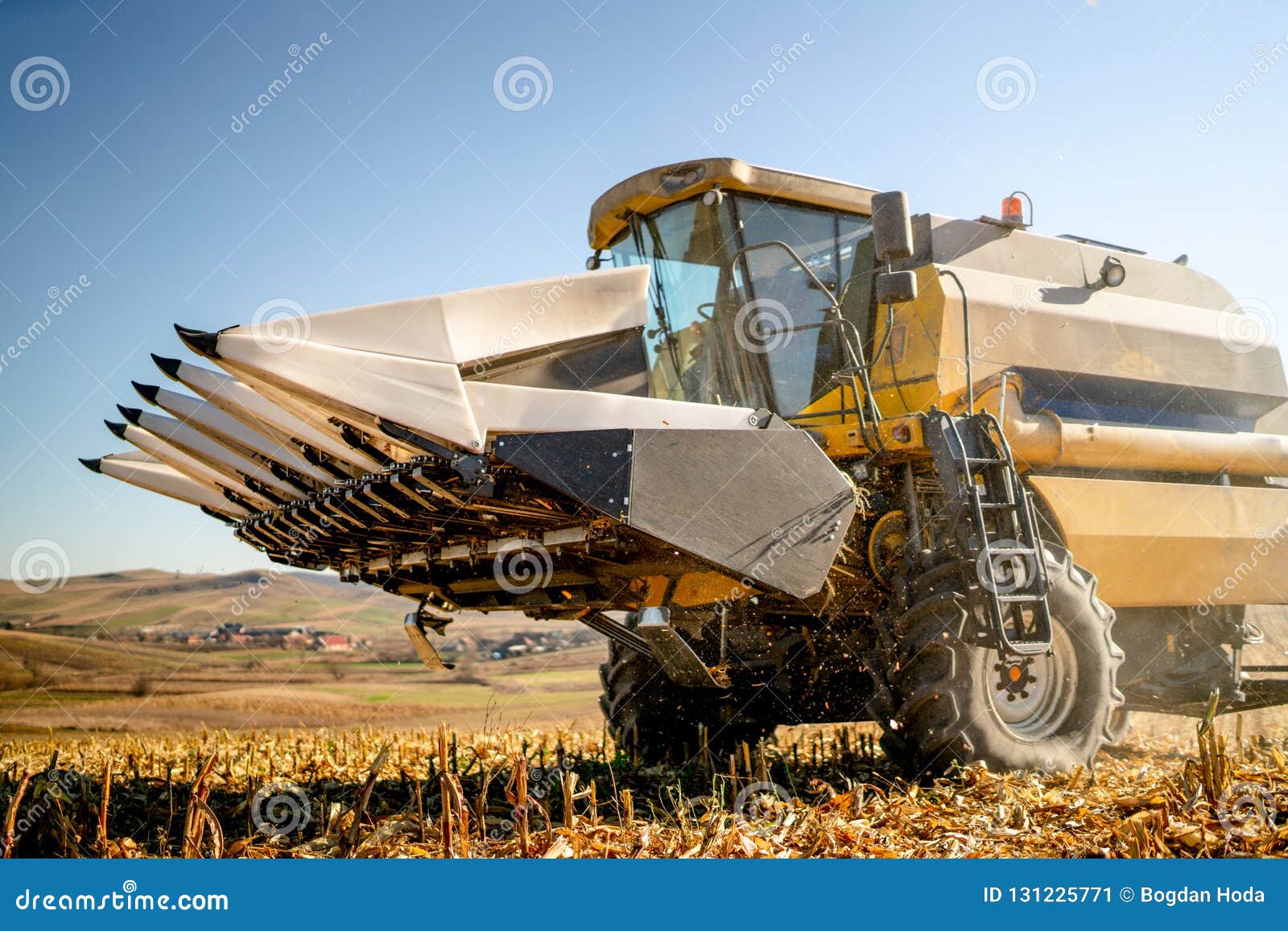 Harvester Working in the Fields. Farmer Using Combine Machinery ...