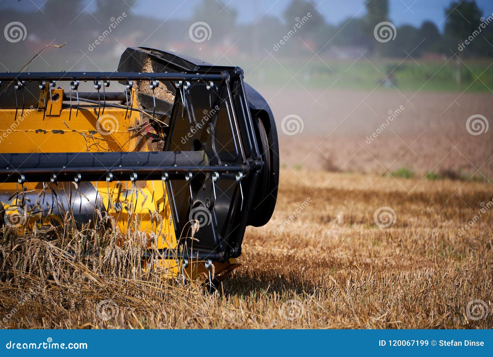 Harvester Working on Wheat Field Stock Image - Image of machinery ...
