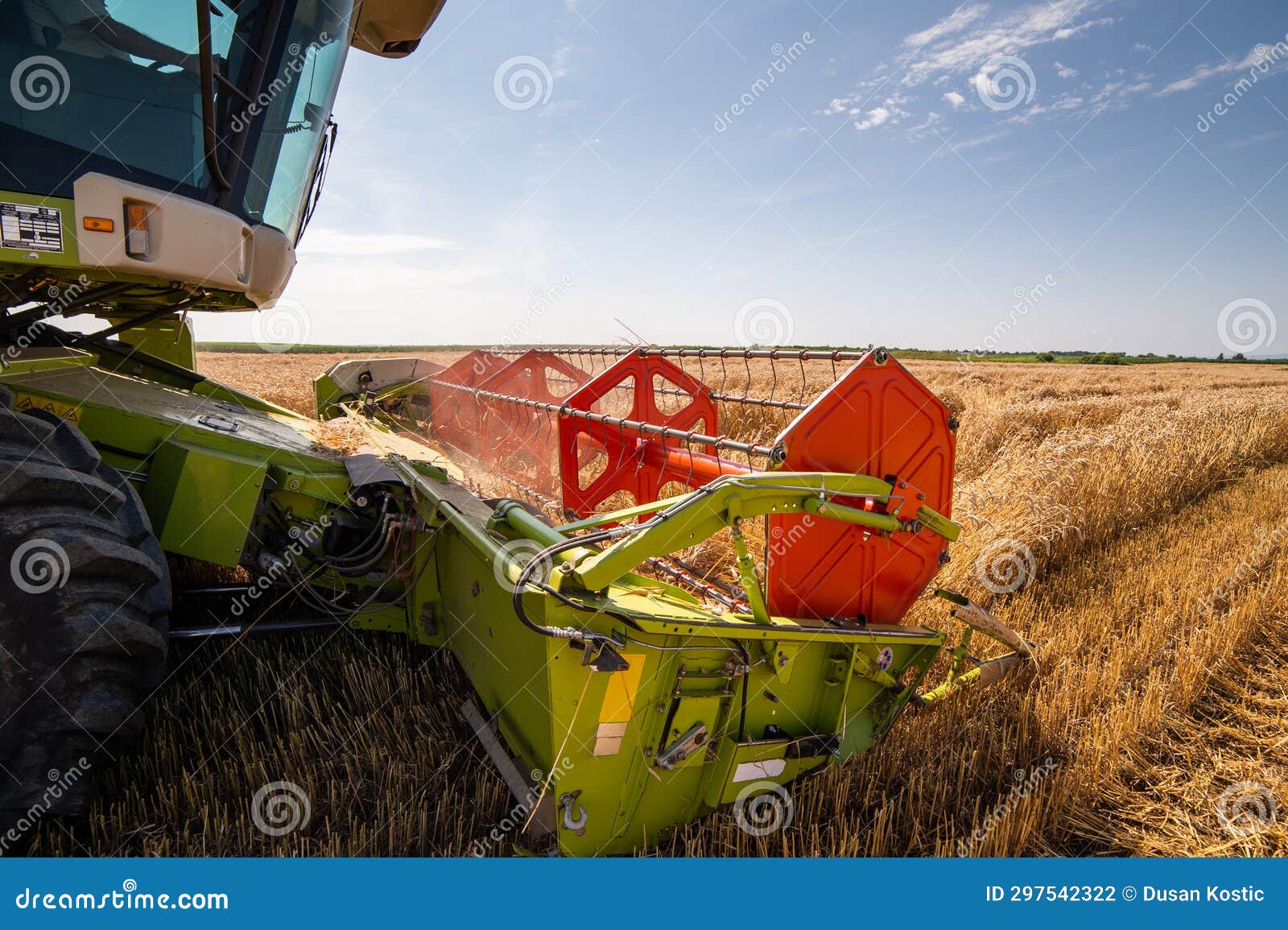 Harvesting Combine in the Wheat Stock Photo - Image of cutting ...