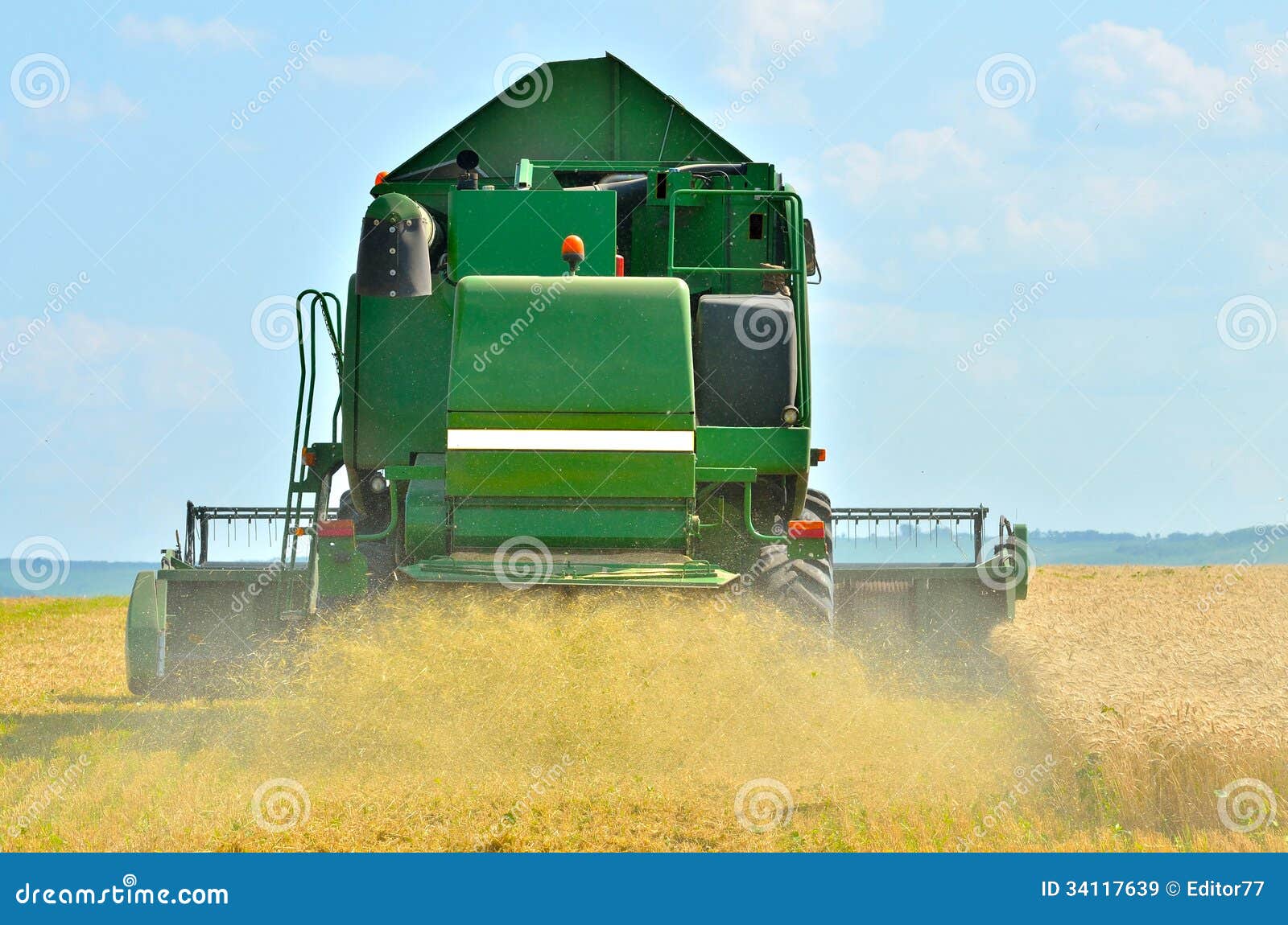 Combine harvester at work editorial stock image. Image of equipment ...